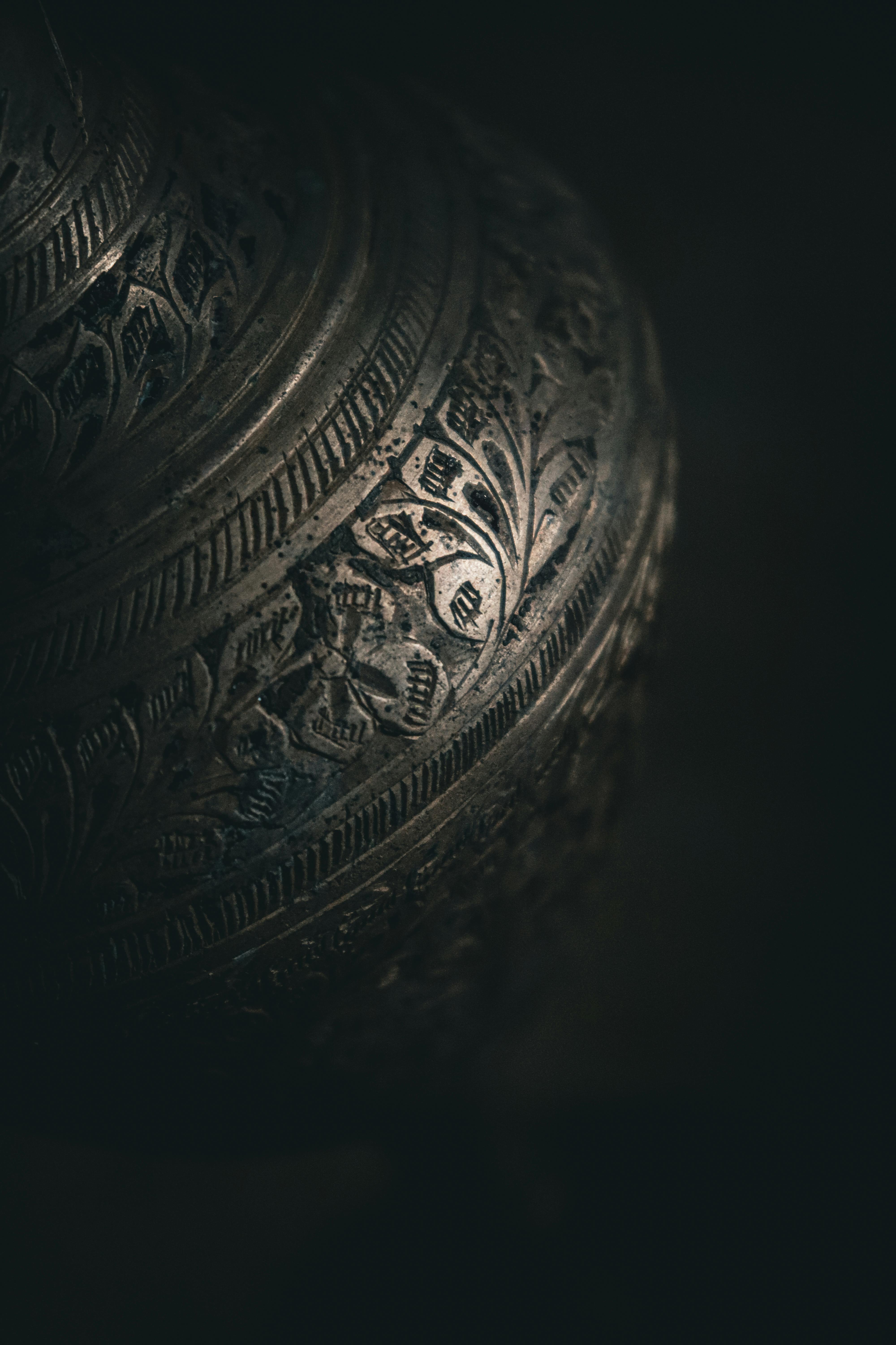 Close-up of Carved Details on a Metal Pot · Free Stock Photo