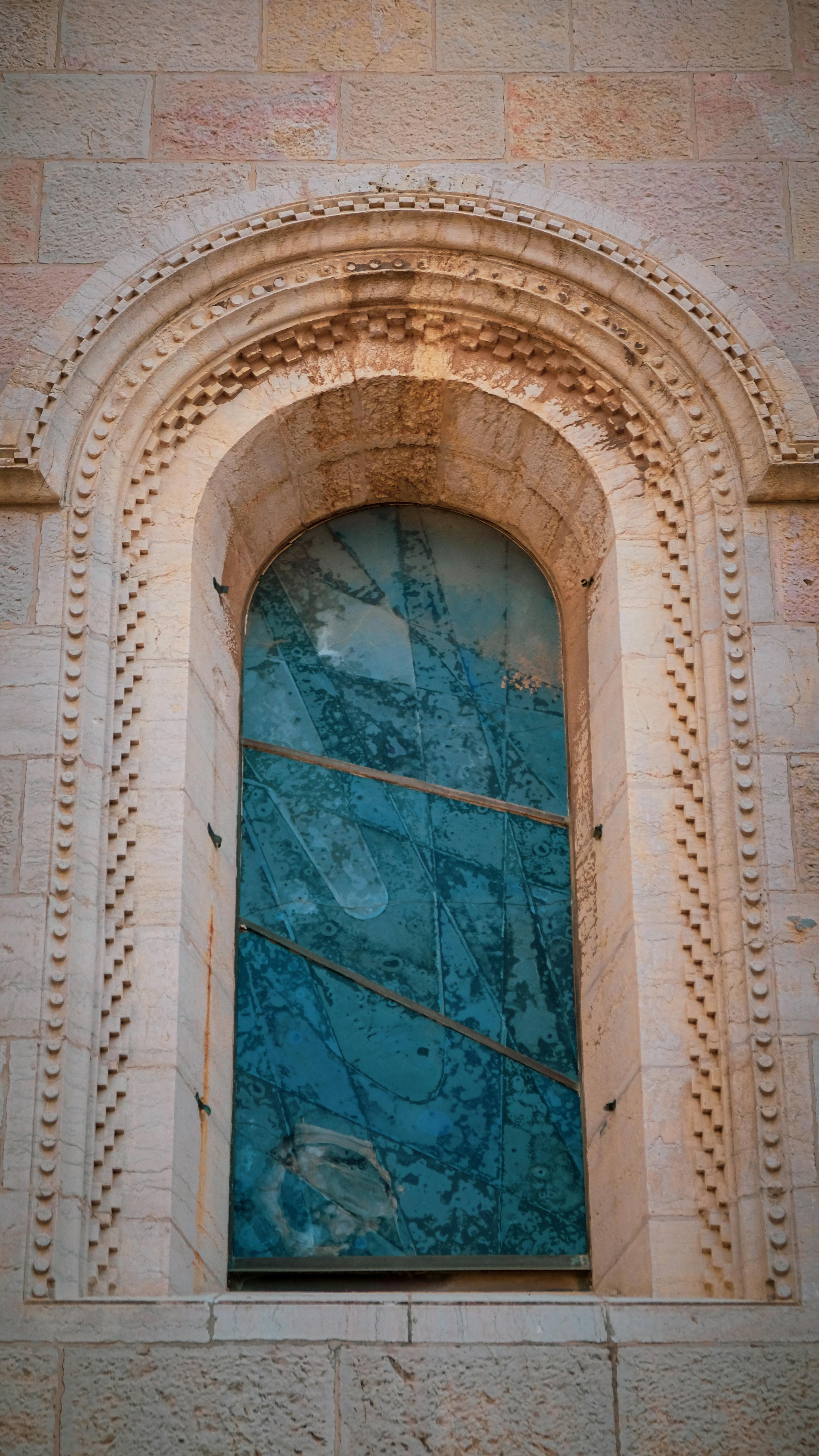 Ornamented Arch over Window · Free Stock Photo