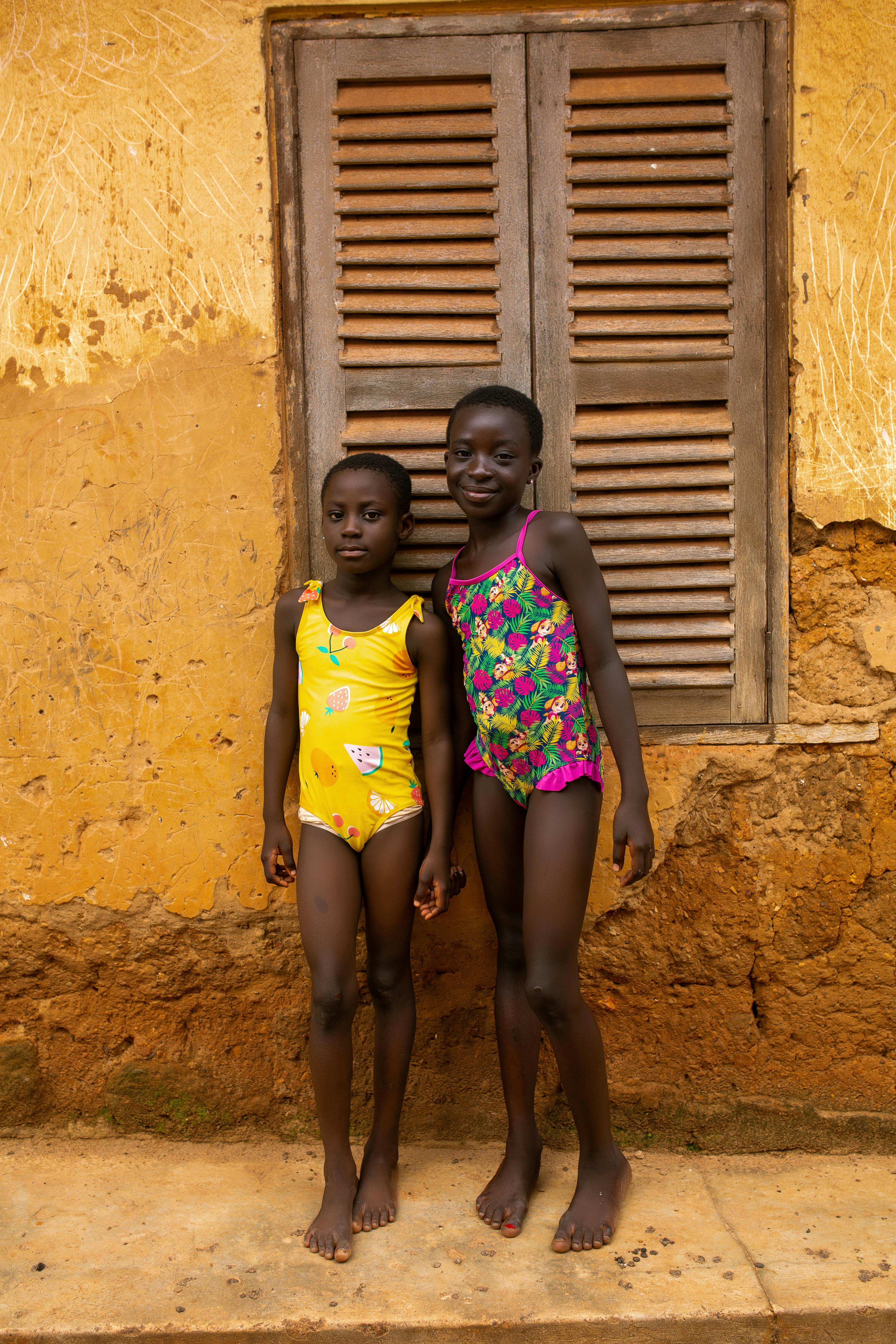 Child Models in Colorful Swimming Costumes · Free Stock Photo
