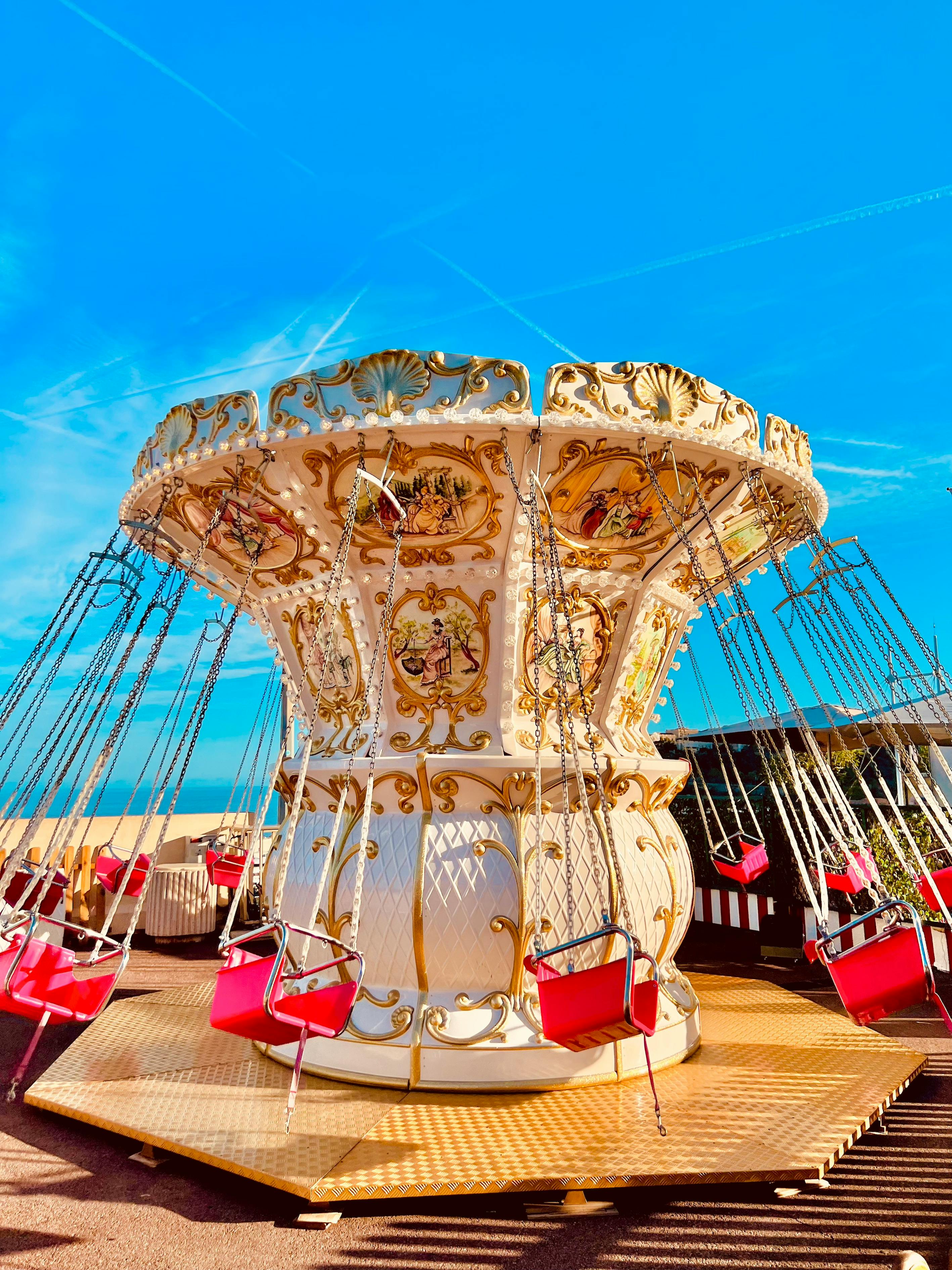 Colorful luminous carousel against Kremlin on Red Square at night ...