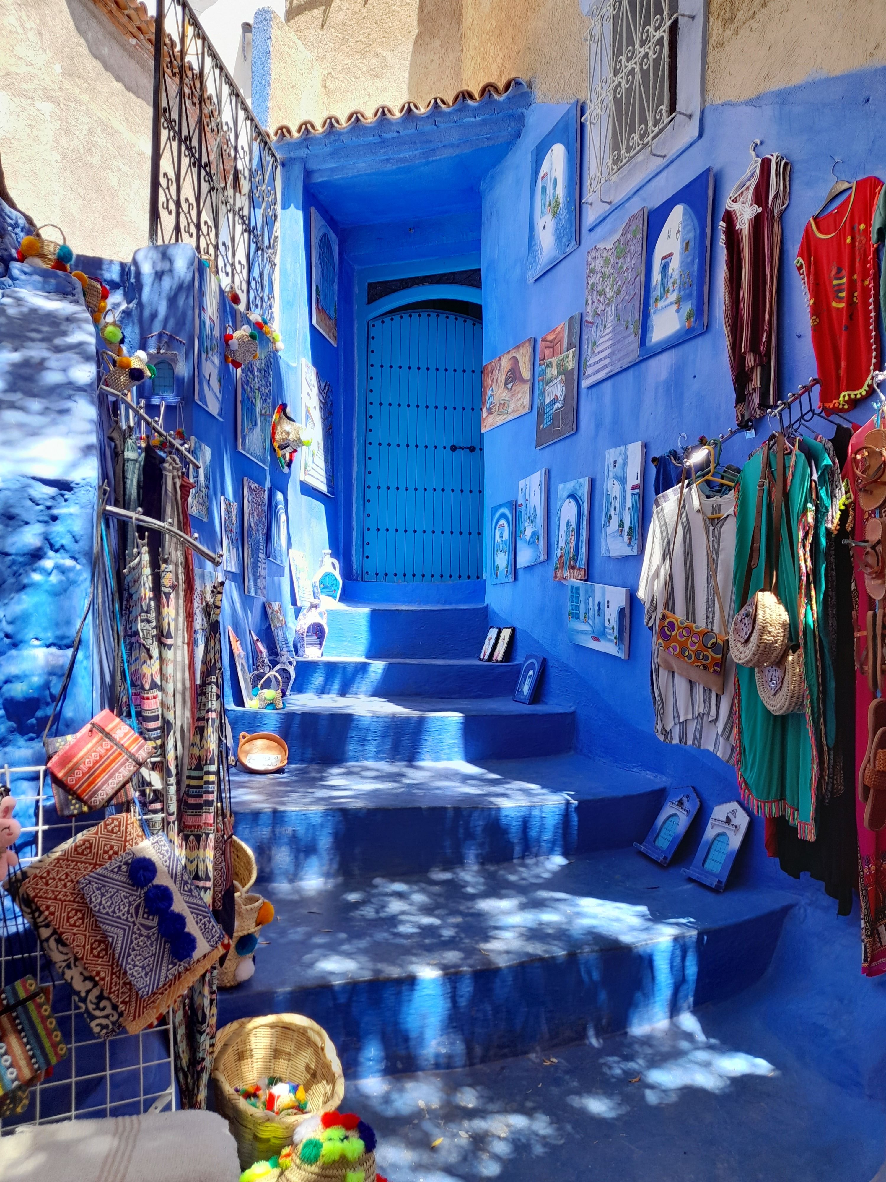 A blue painted alleyway with blue walls and blue doors · Free Stock Photo