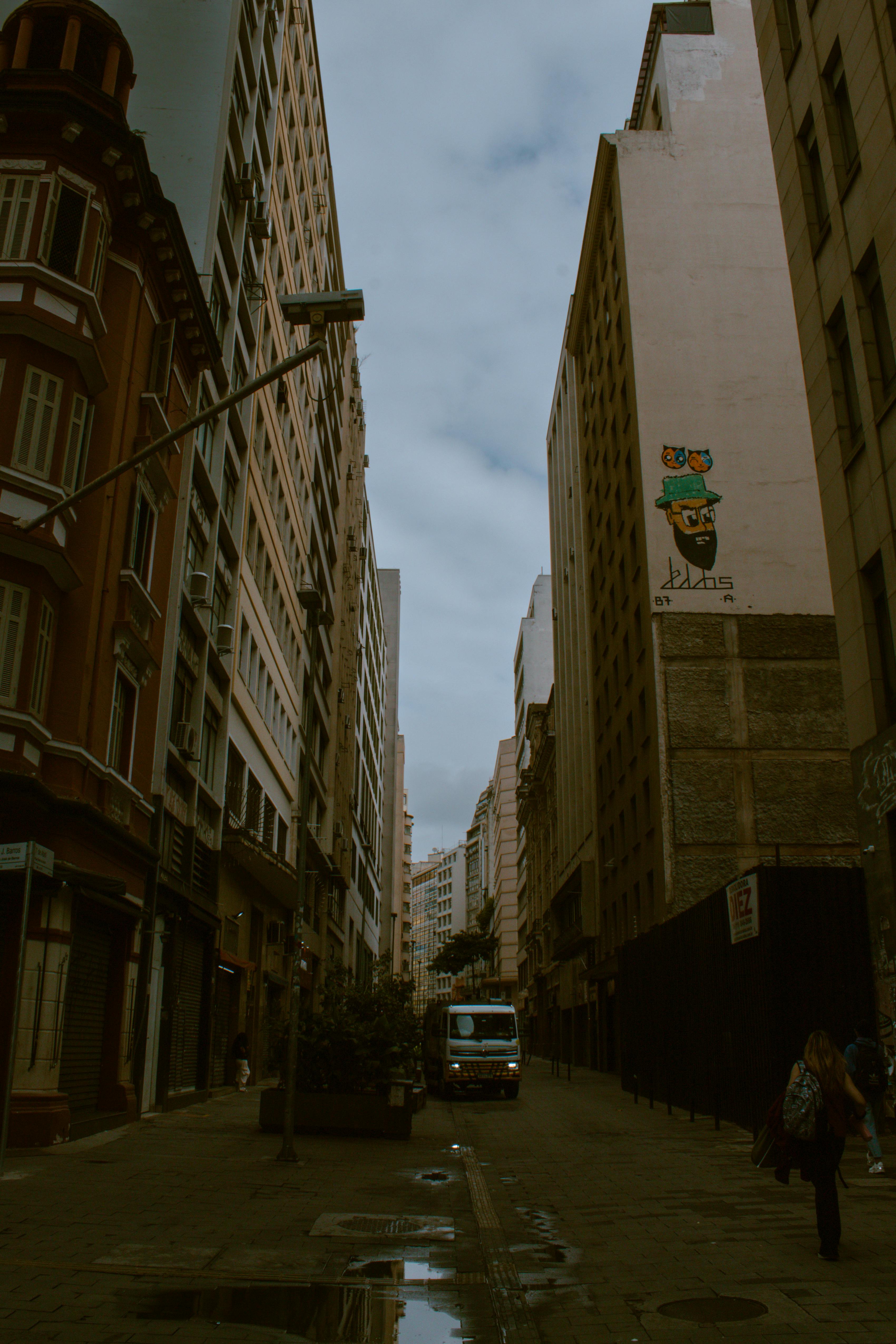 Low Angle Shot of a Street Between Buildings · Free Stock Photo
