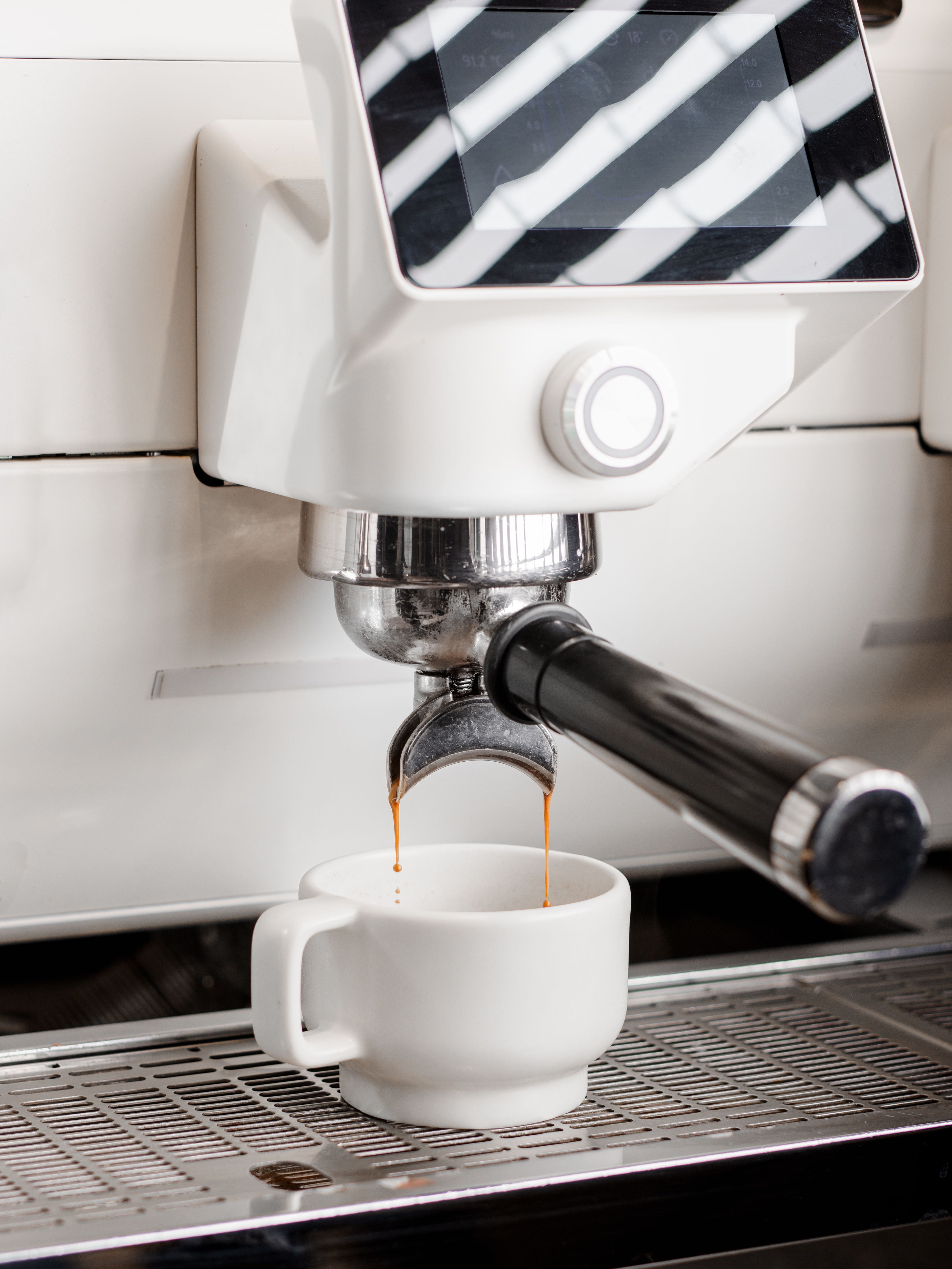 Espresso Machine Extracting Coffee and Dripping in White Cup · Free ...