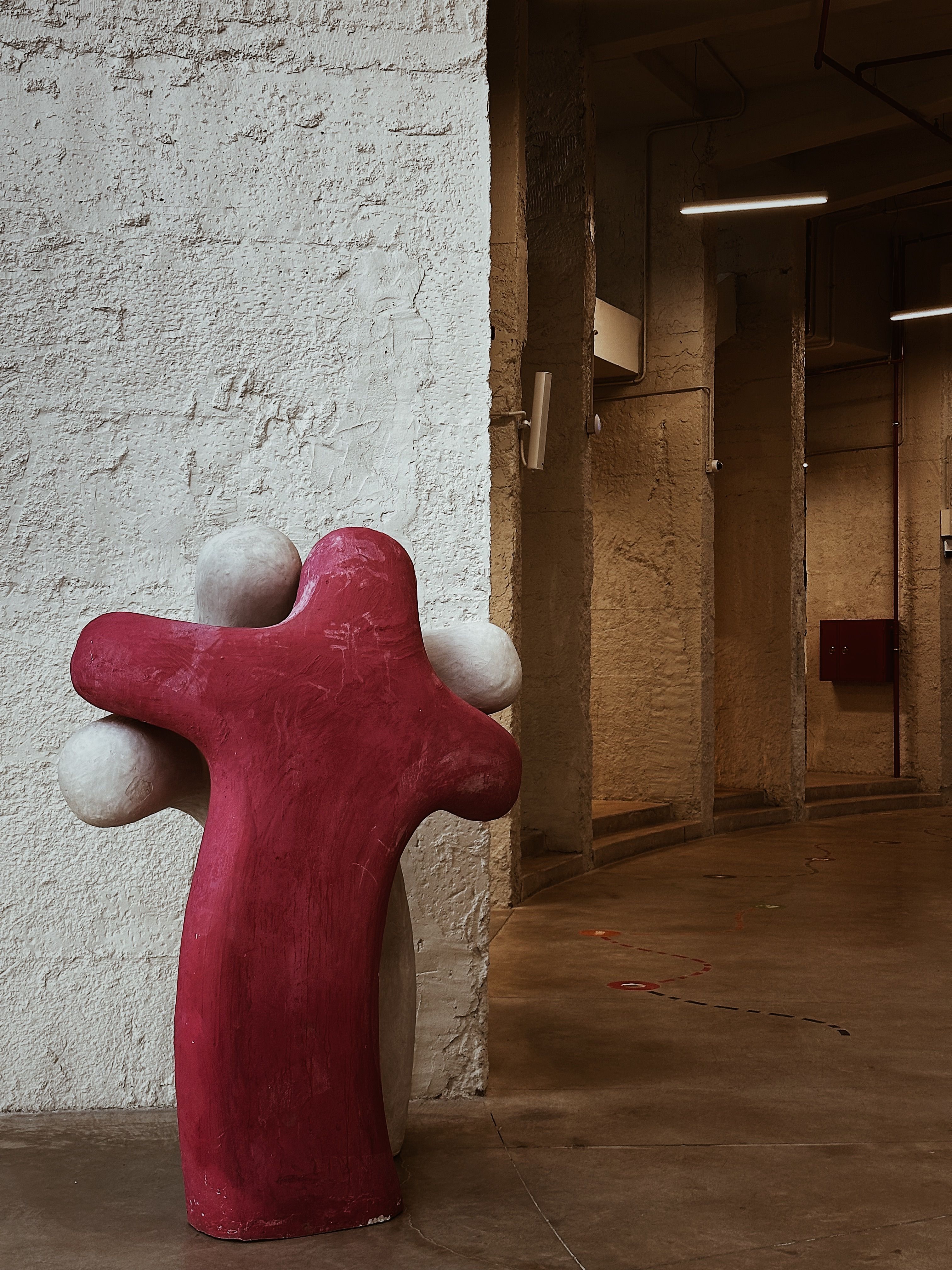 White and Red Statue on Pavement · Free Stock Photo