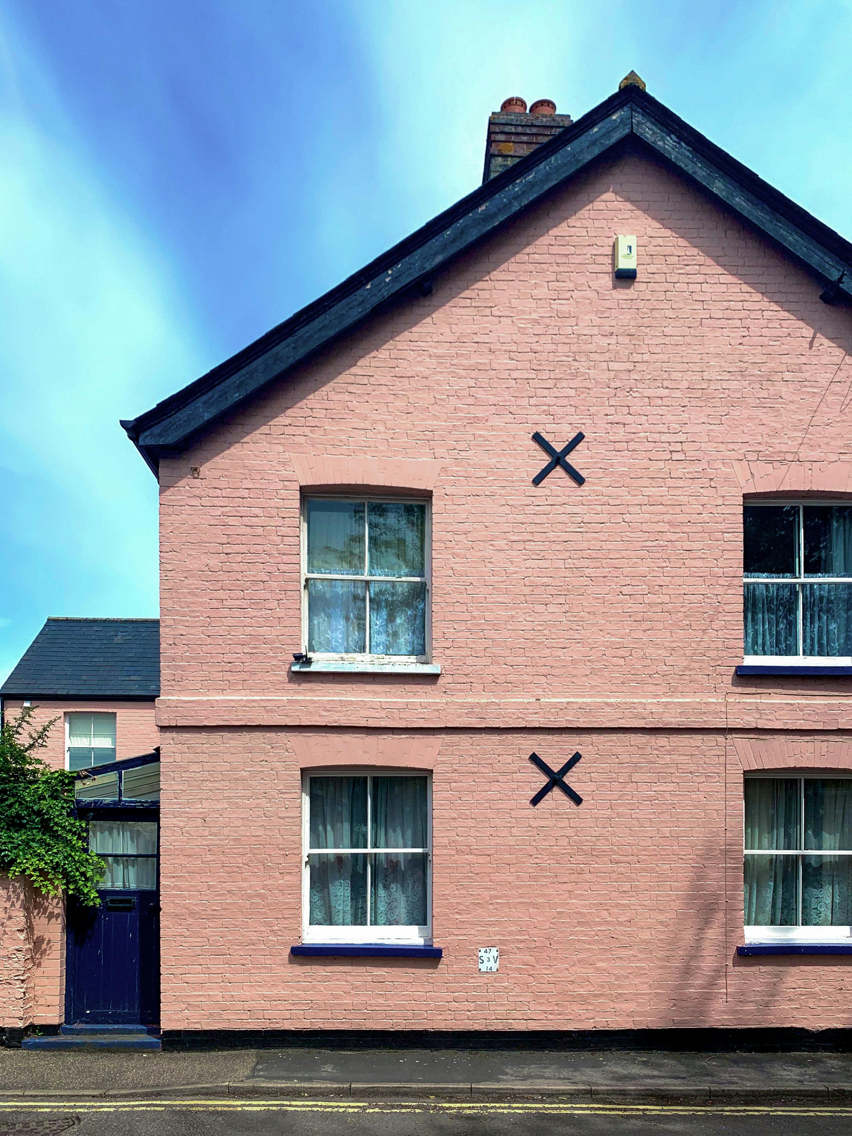 Facade of a Pink Brick House · Free Stock Photo