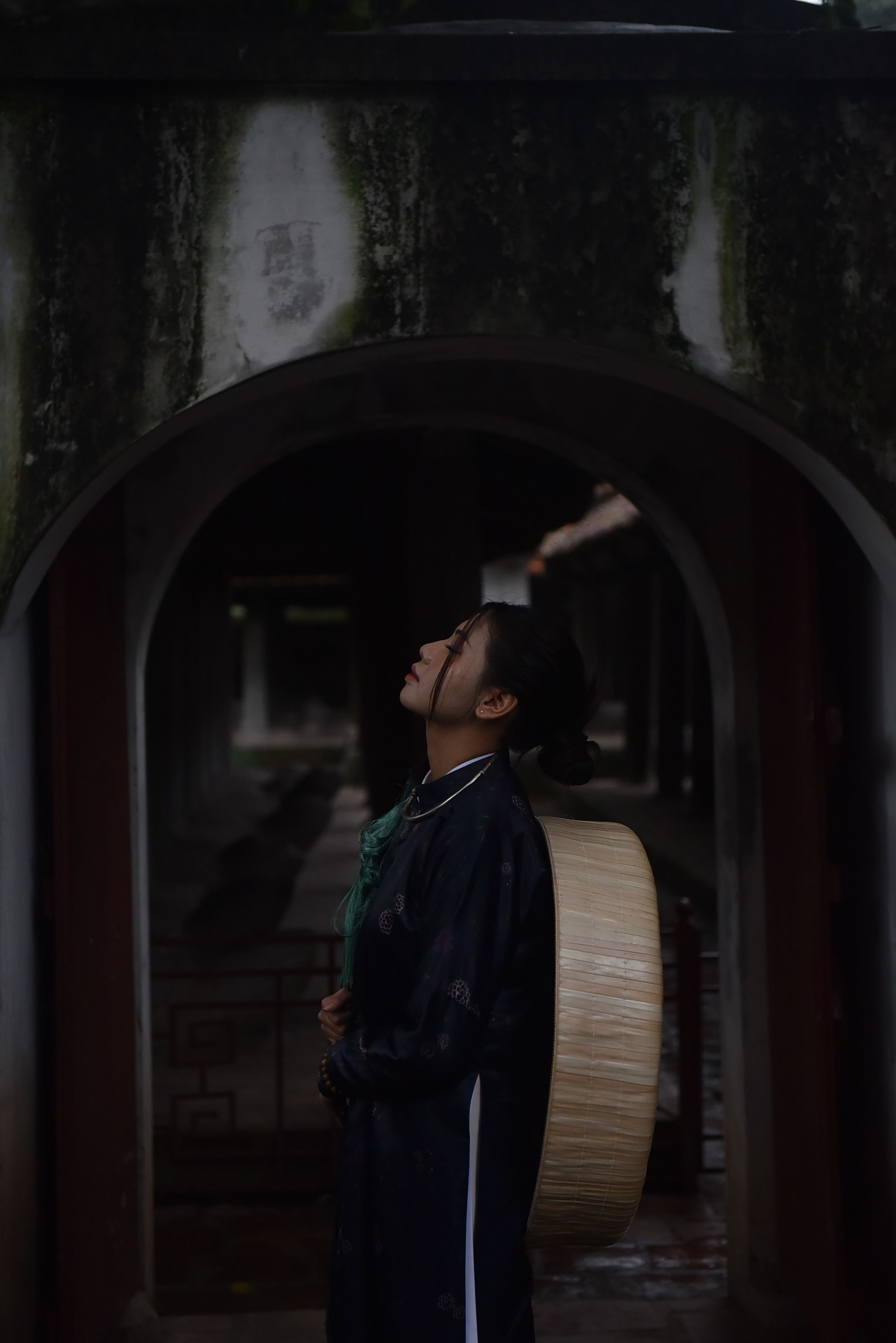 Person Standing Under Archway · Free Stock Photo