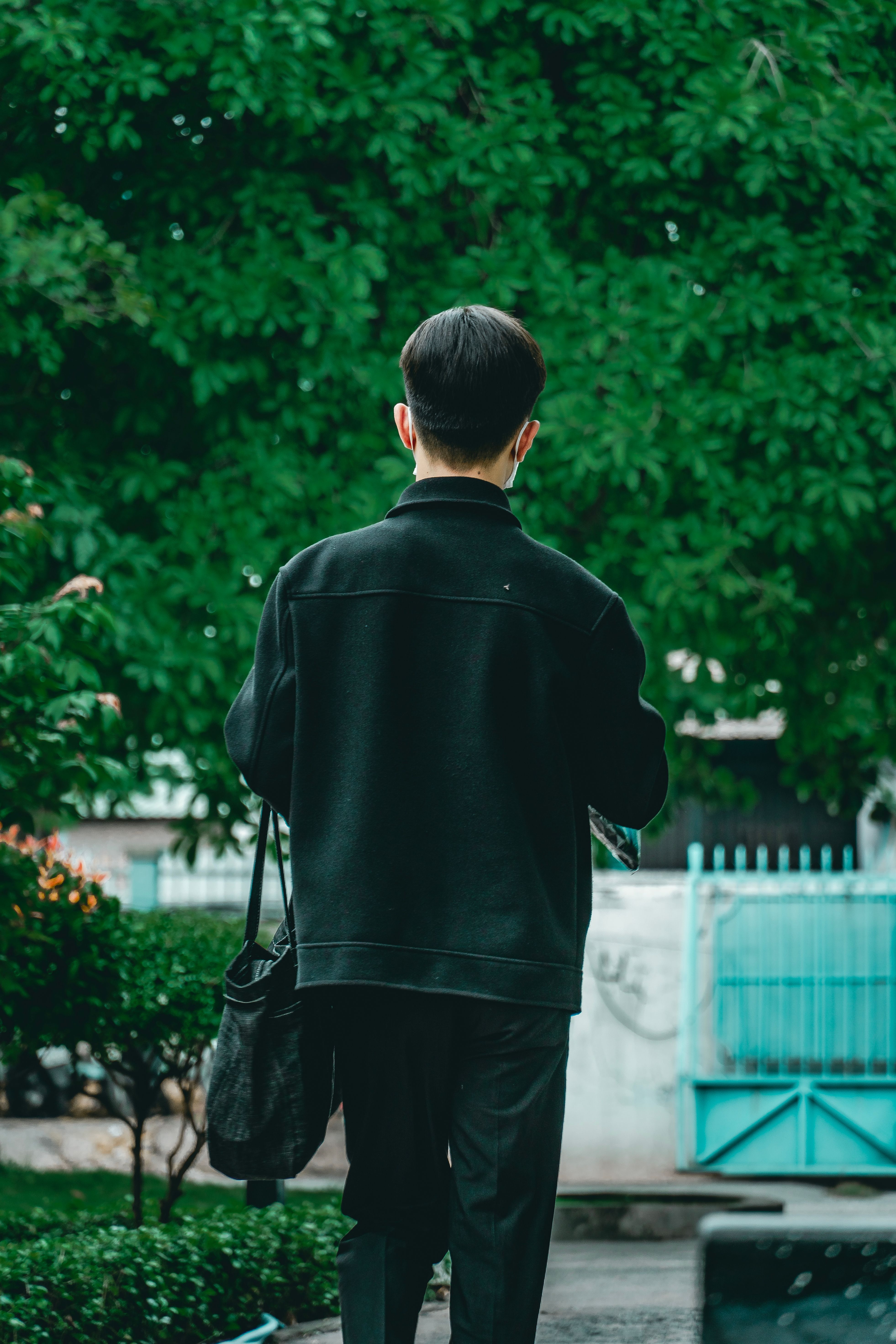 Back View of Man in Black Clothes · Free Stock Photo