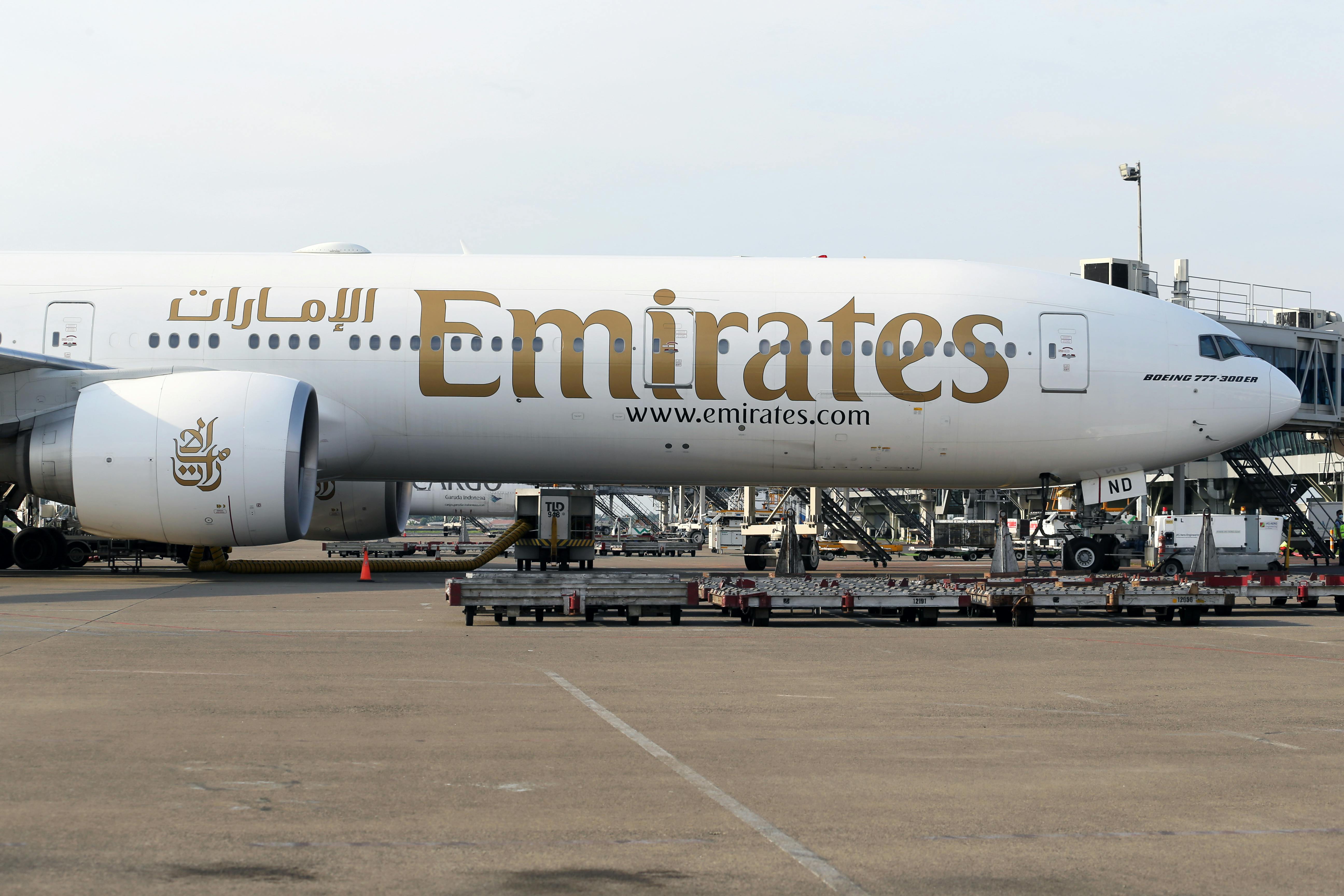 Emirate Airlines Airplane on Tarmac · Free Stock Photo