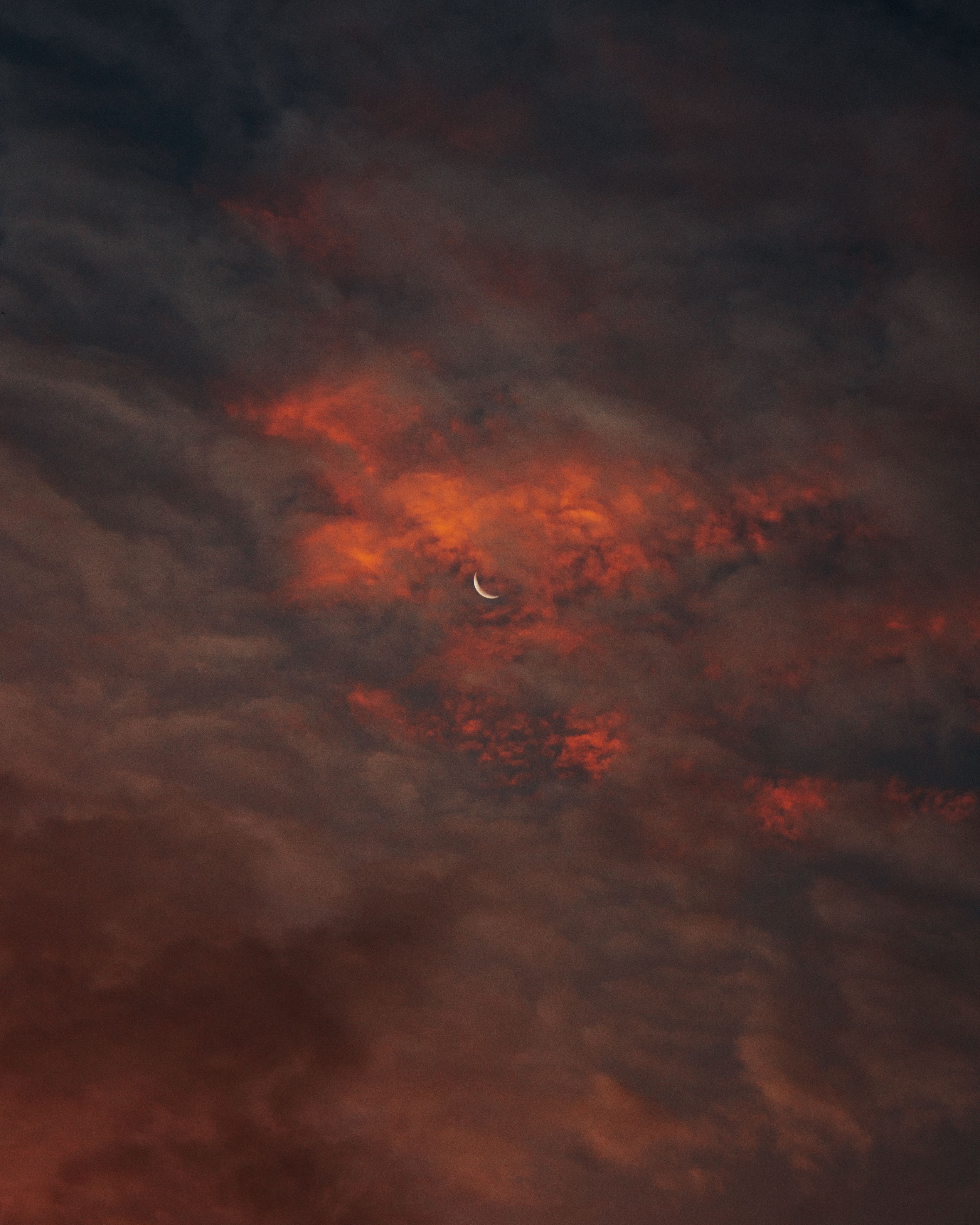 Crescent Moon in Red Cloudy Night Sky · Free Stock Photo
