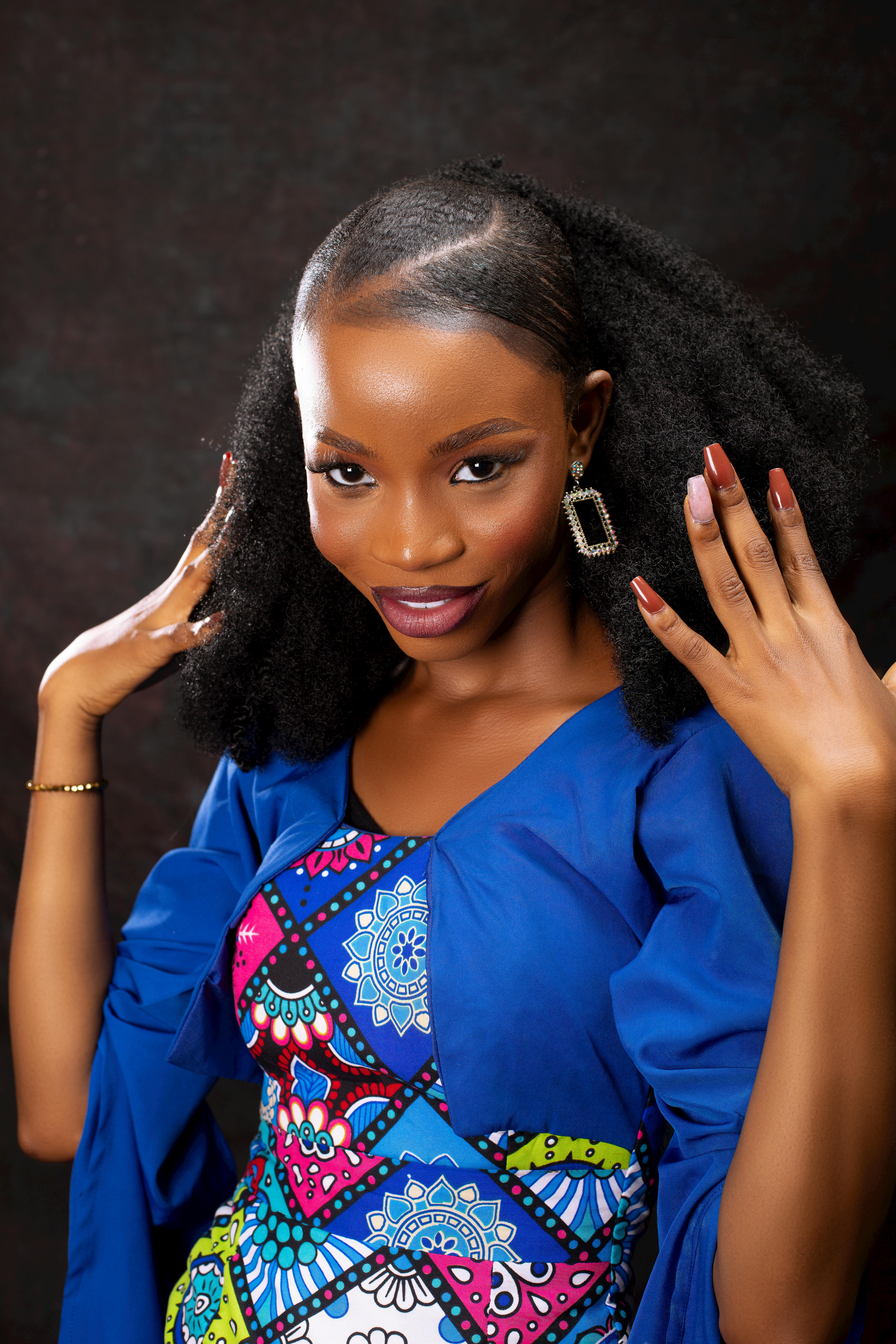 Woman in Blue Dress with Floral Pattern · Free Stock Photo