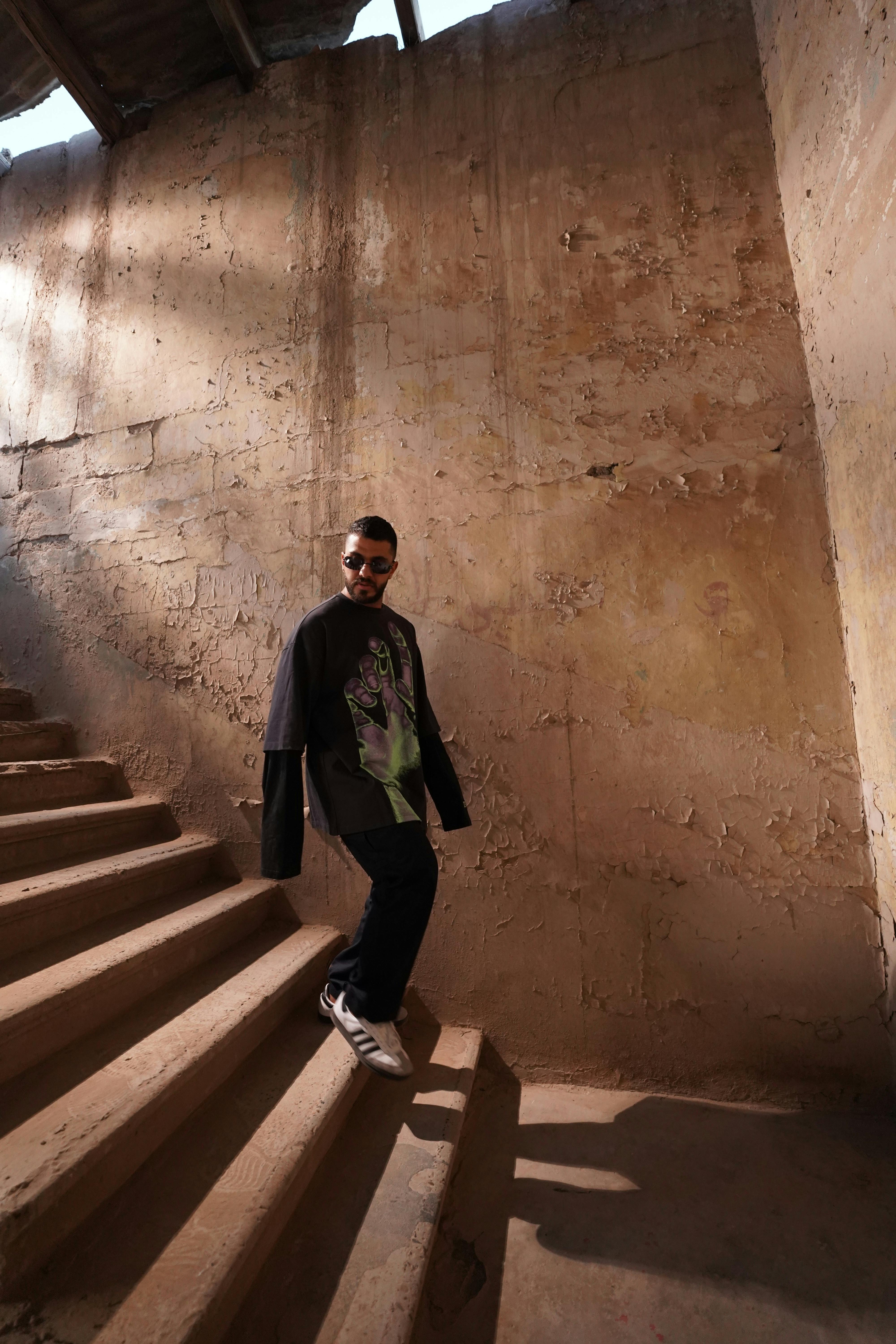 Man Walking Down Steps · Free Stock Photo