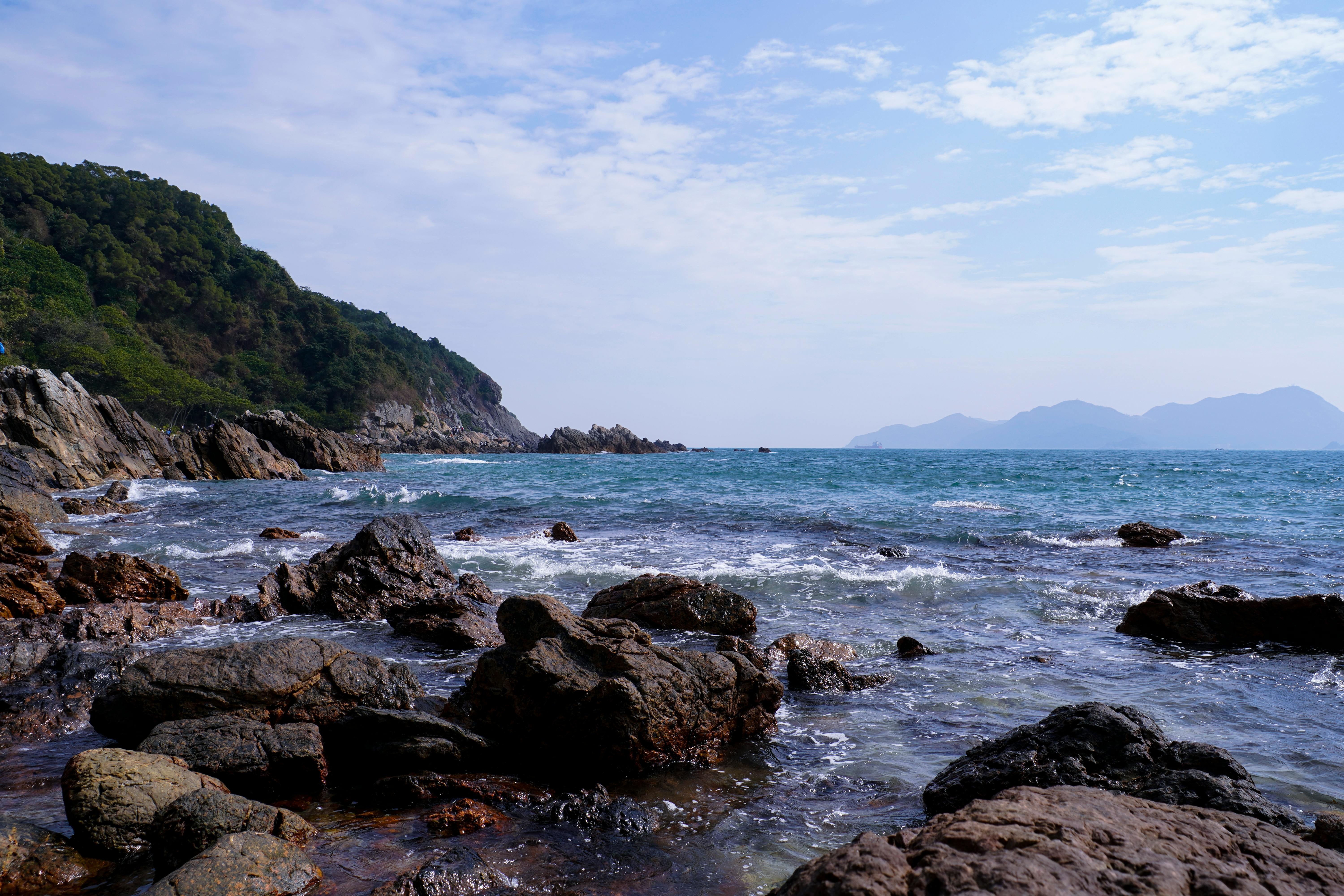 Rocks in Ocean near to Shore · Free Stock Photo