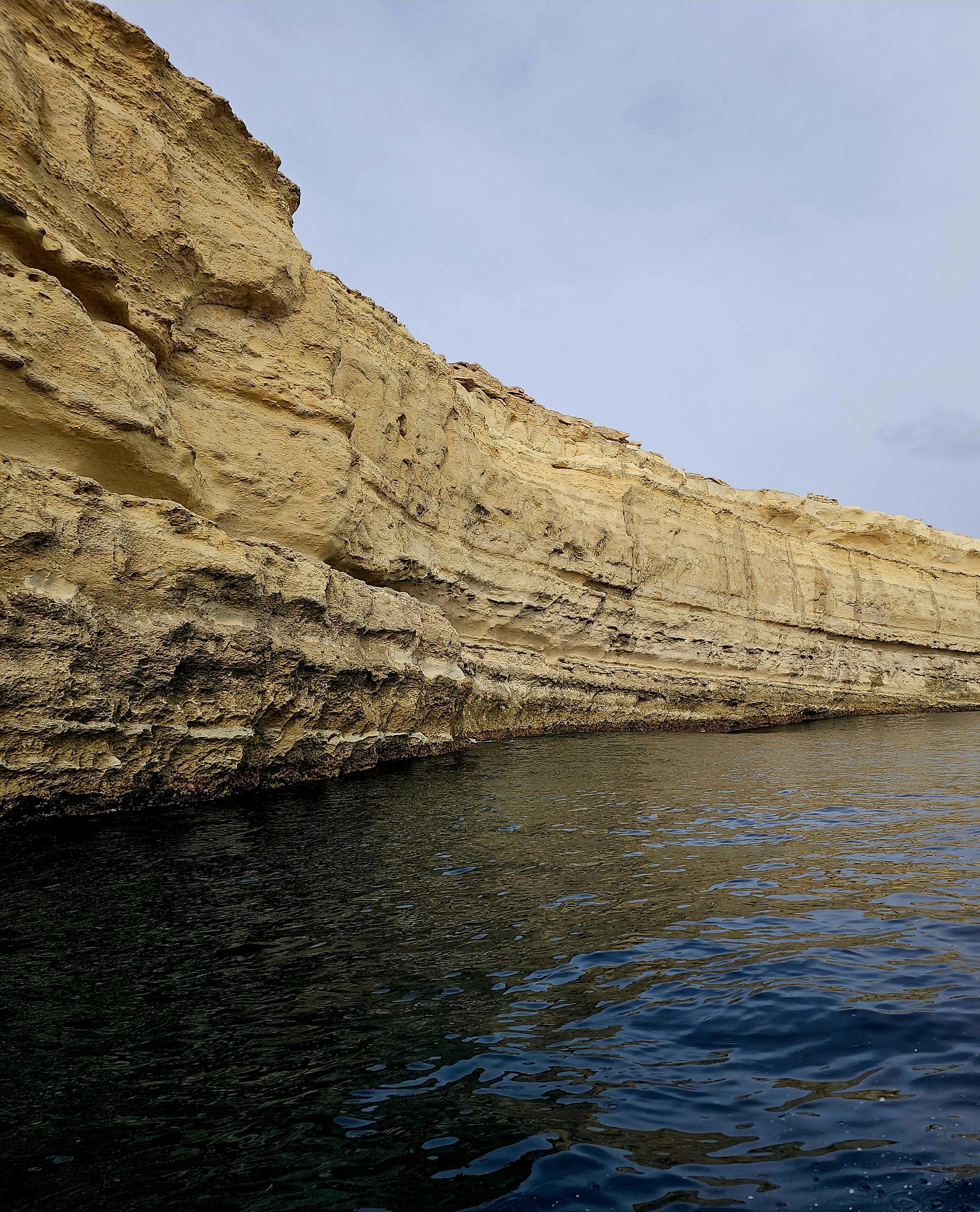 Barren Cliff on Sea Shore · Free Stock Photo