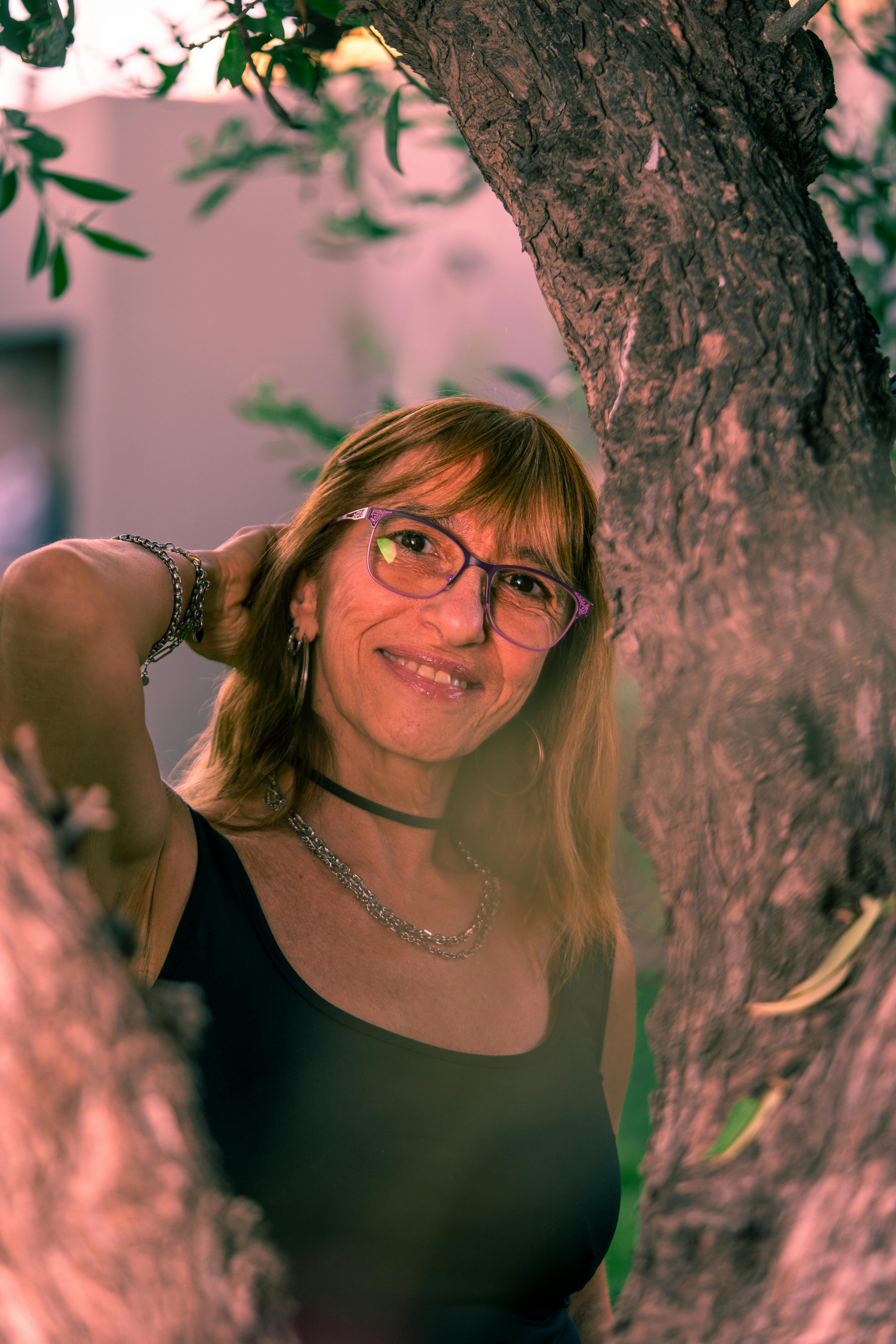 Smiling Woman by Tree · Free Stock Photo