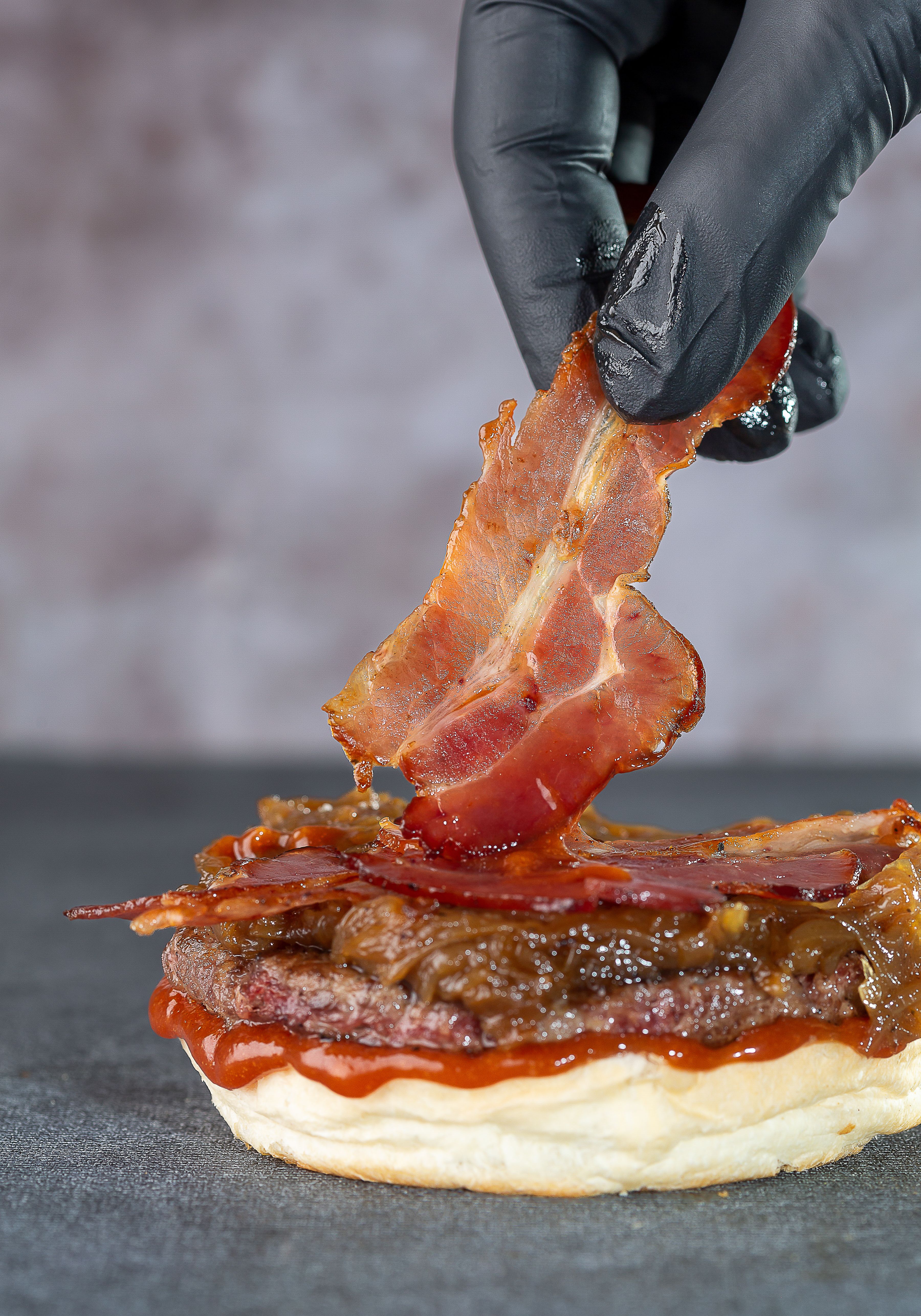 Man Preparing a Burger · Free Stock Photo