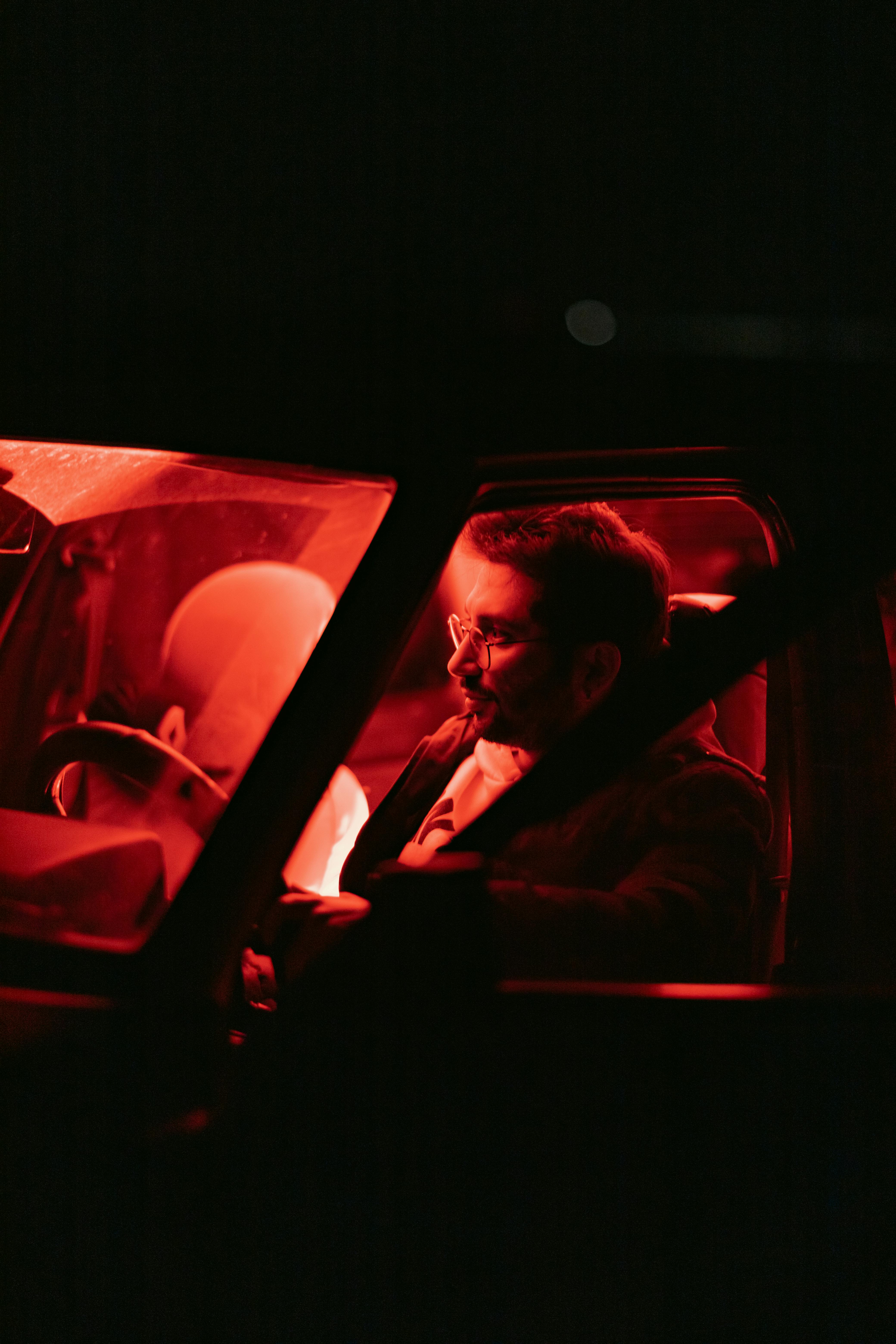 Red Light over Man Sitting in Car · Free Stock Photo