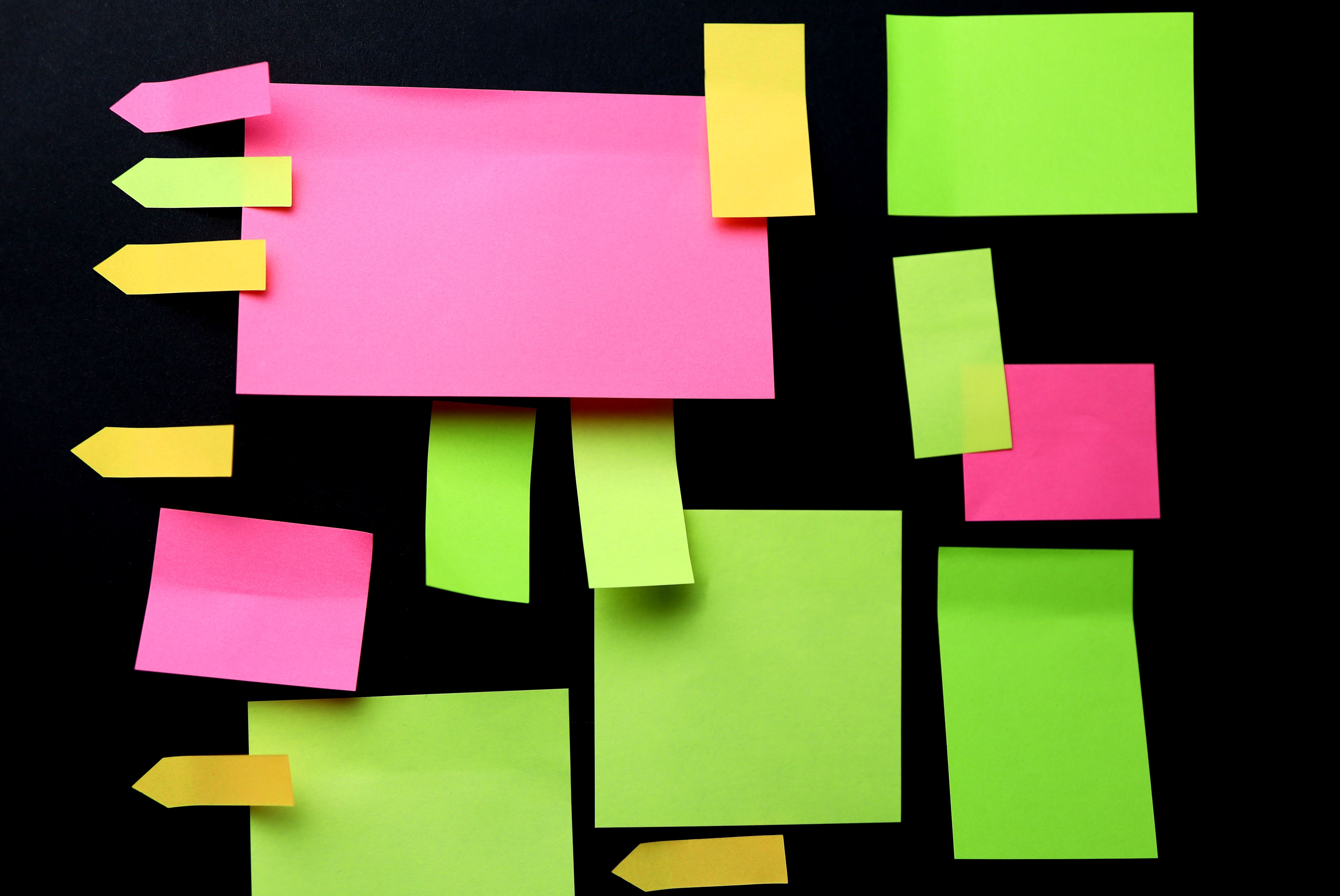 Sticky Notes in Various Colors and Shapes on a Black Background · Free ...