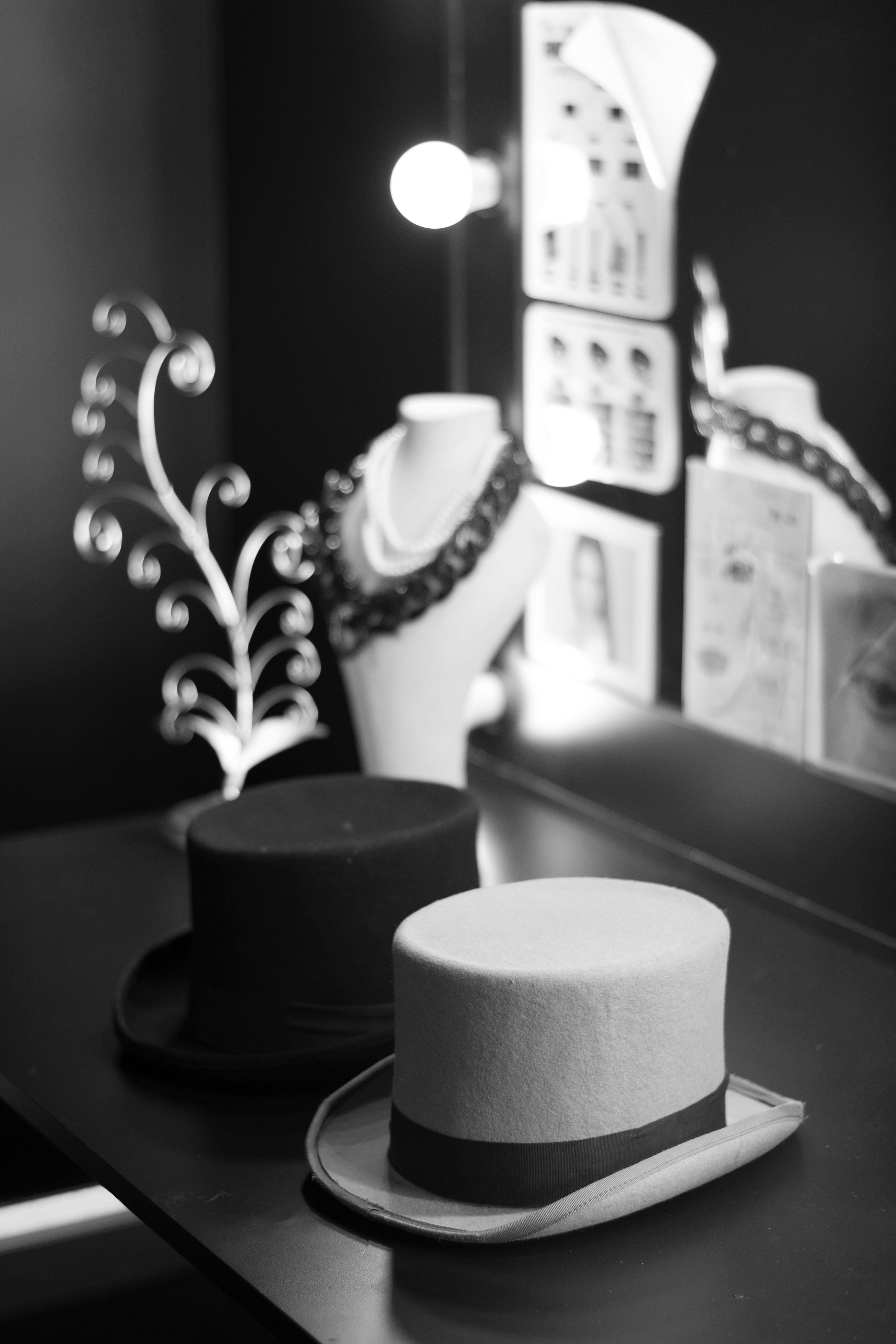 Two Top Hats at Vanity Mirror · Free Stock Photo