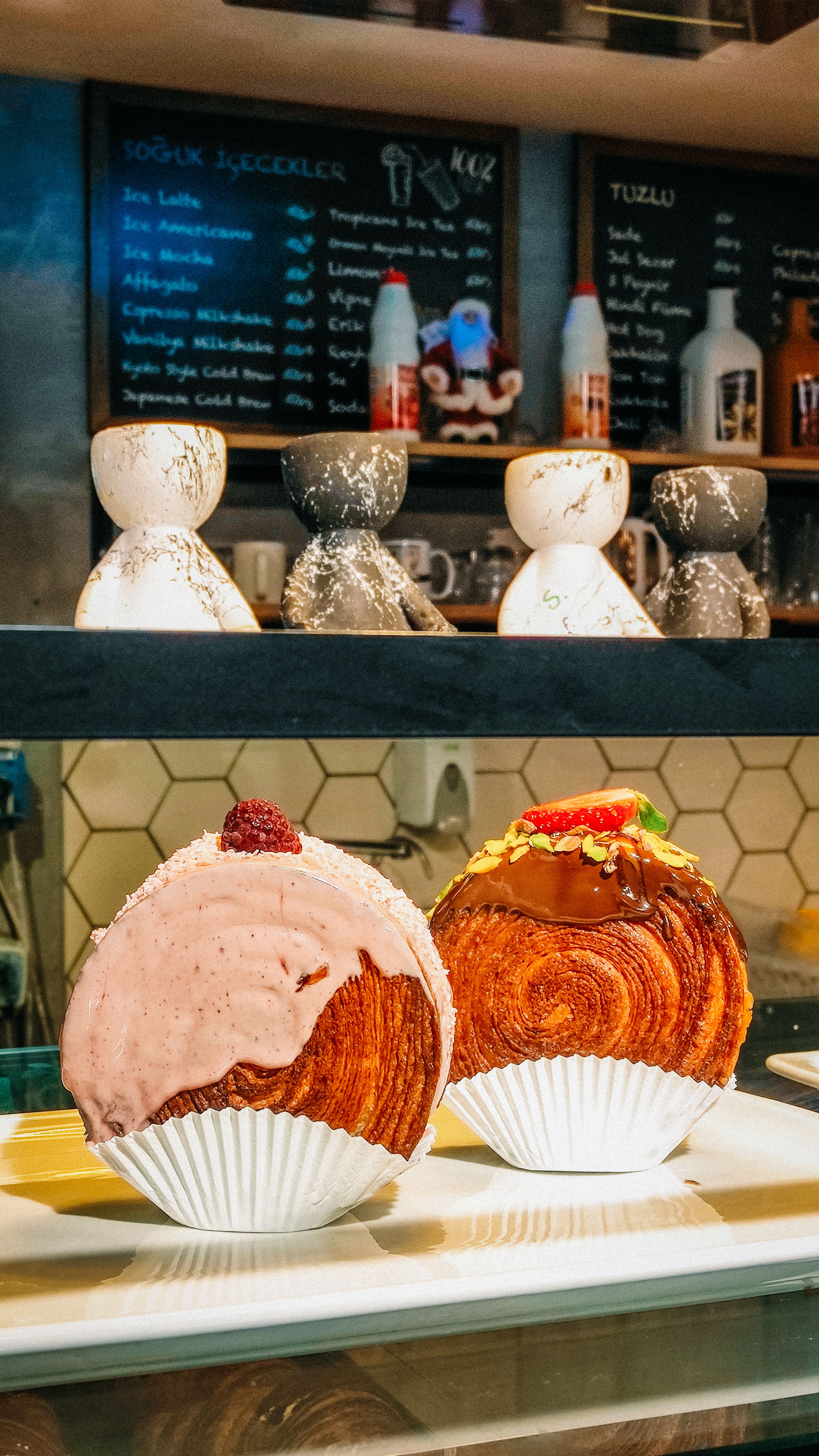 Sweet Rolls with Fruit and Chocolate in Cafe · Free Stock Photo