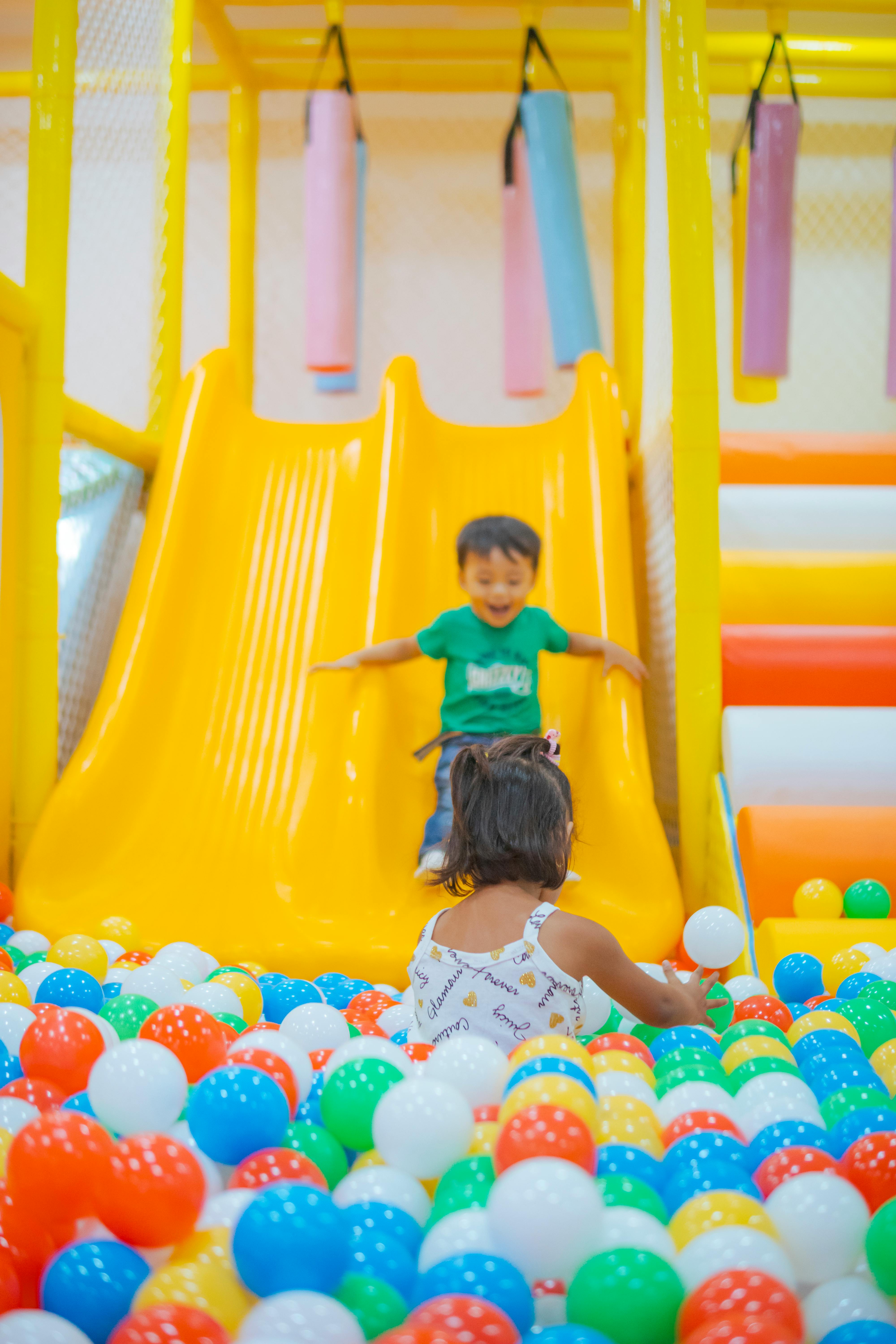 Child on Slide · Free Stock Photo