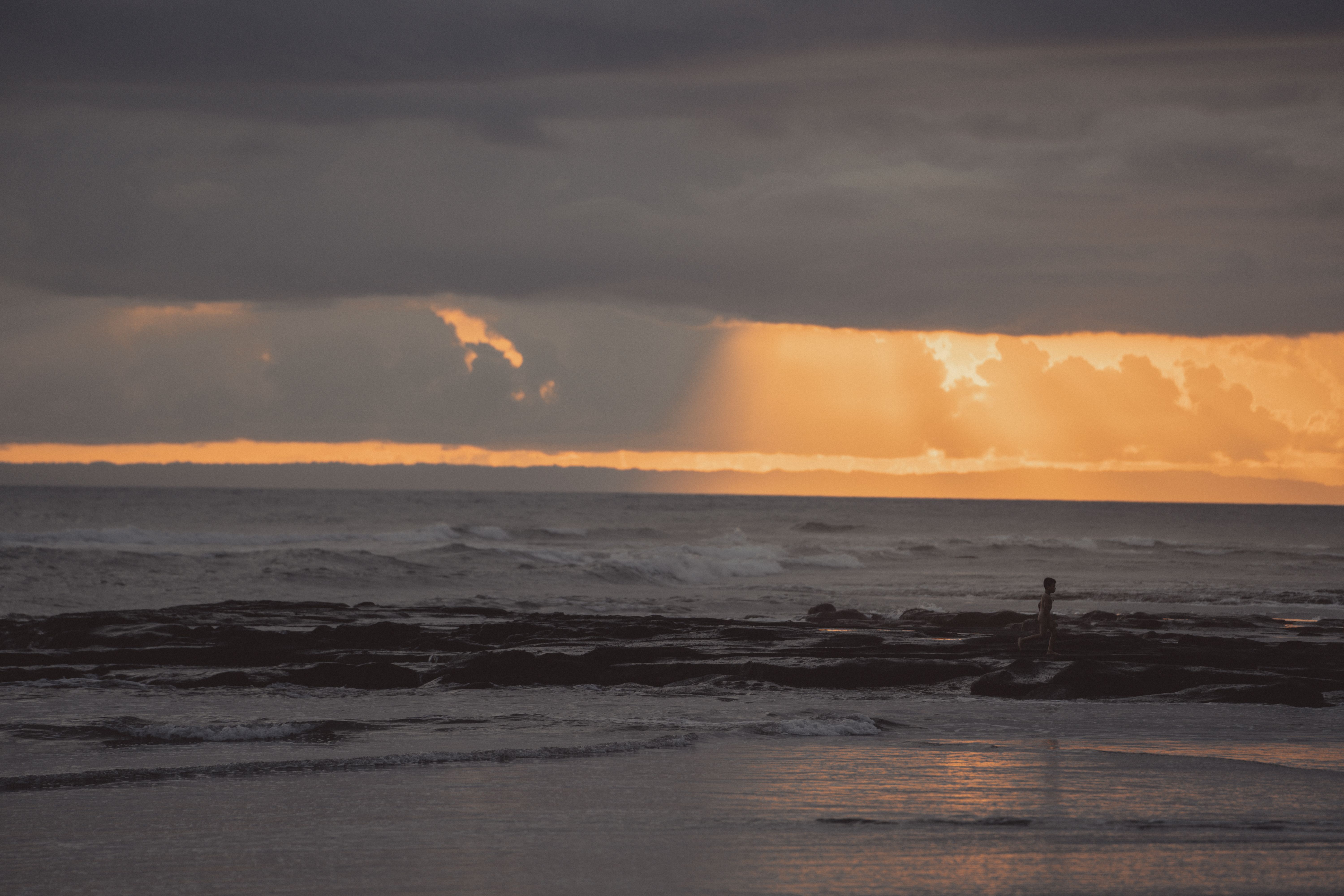 Overcast over Sea Shore at Sunset · Free Stock Photo
