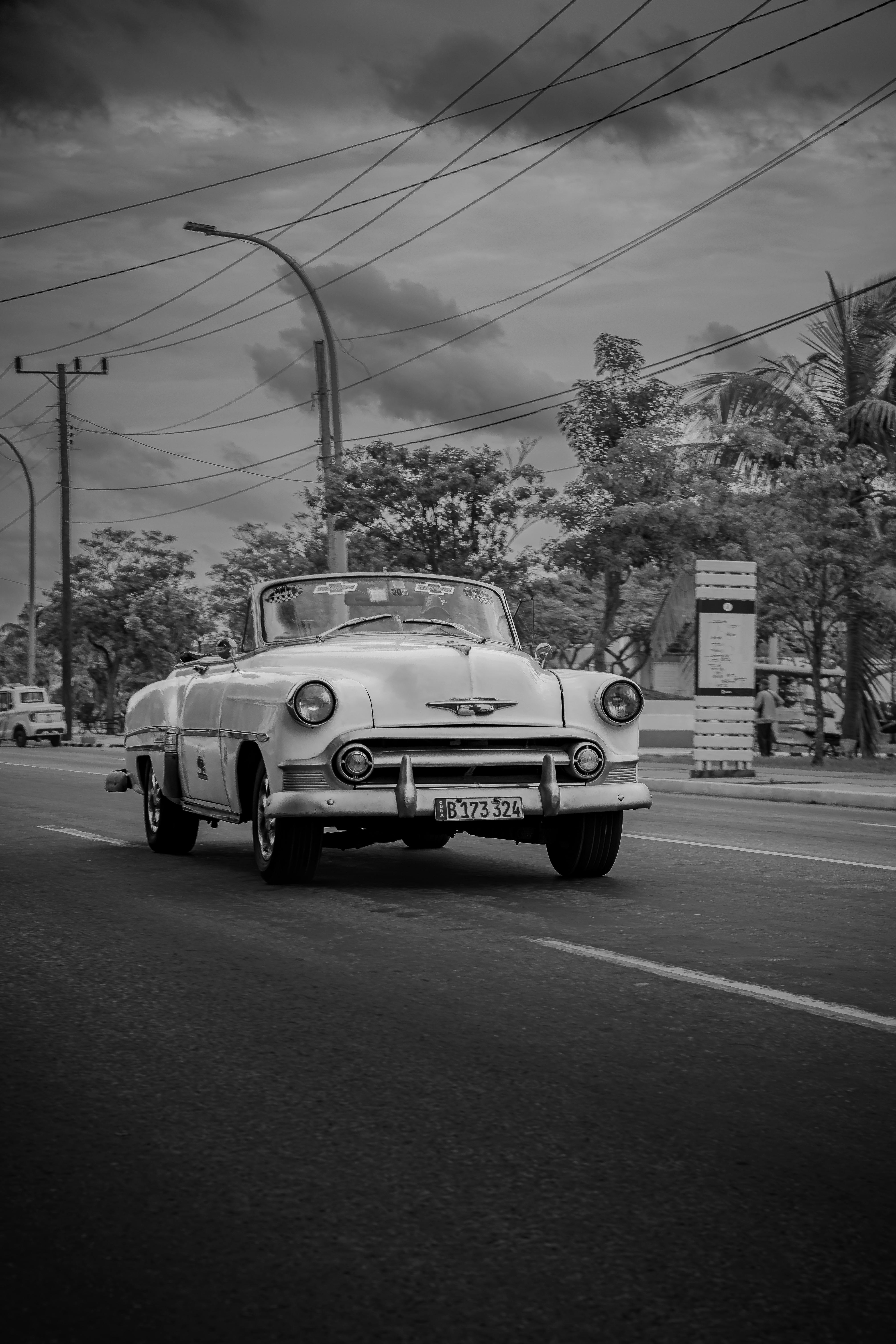 Chevrolet Bel Air Cabriolet on Street in Black and White · Free Stock Photo