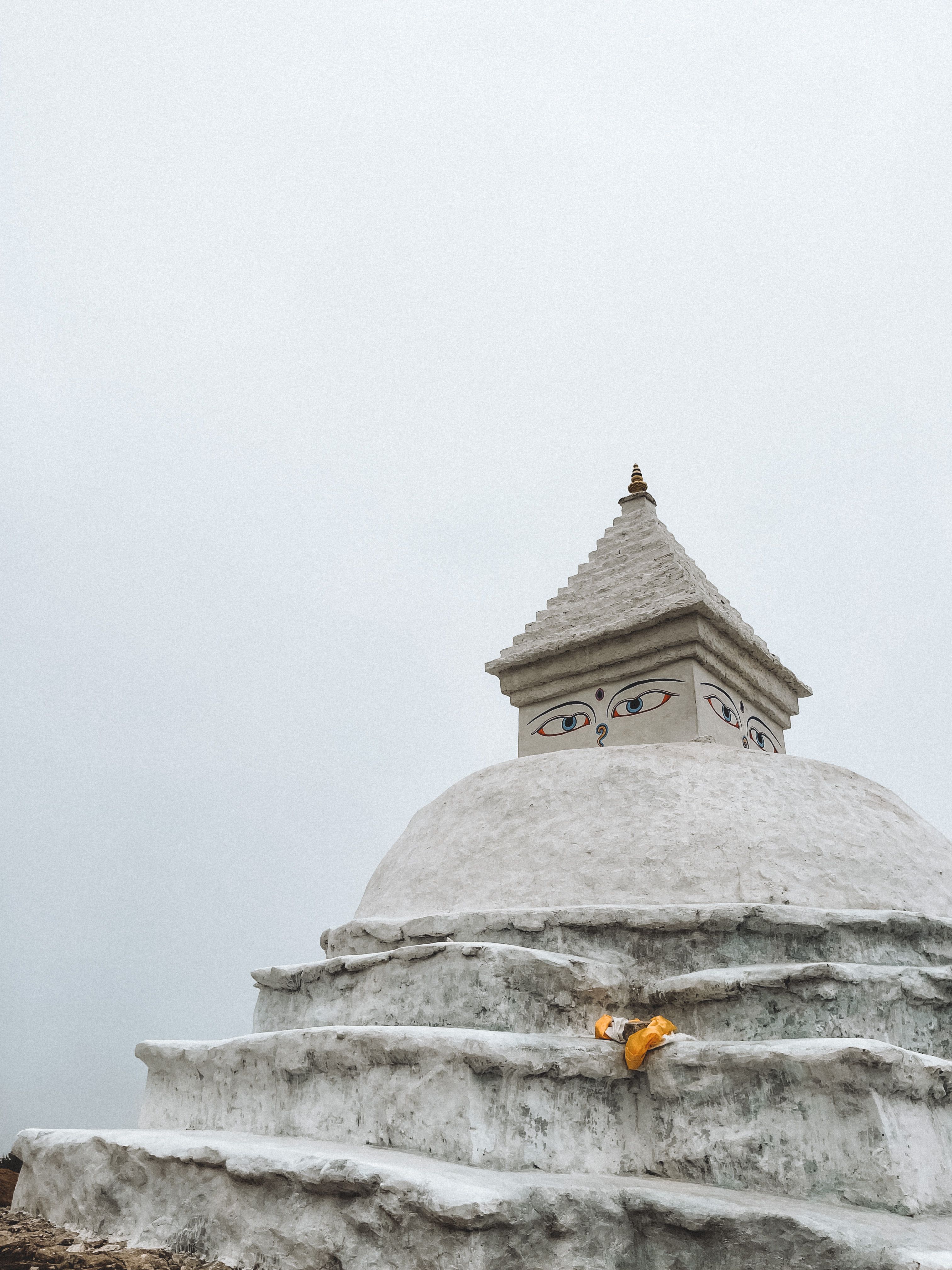 A small white stupa on top of a mountain · Free Stock Photo