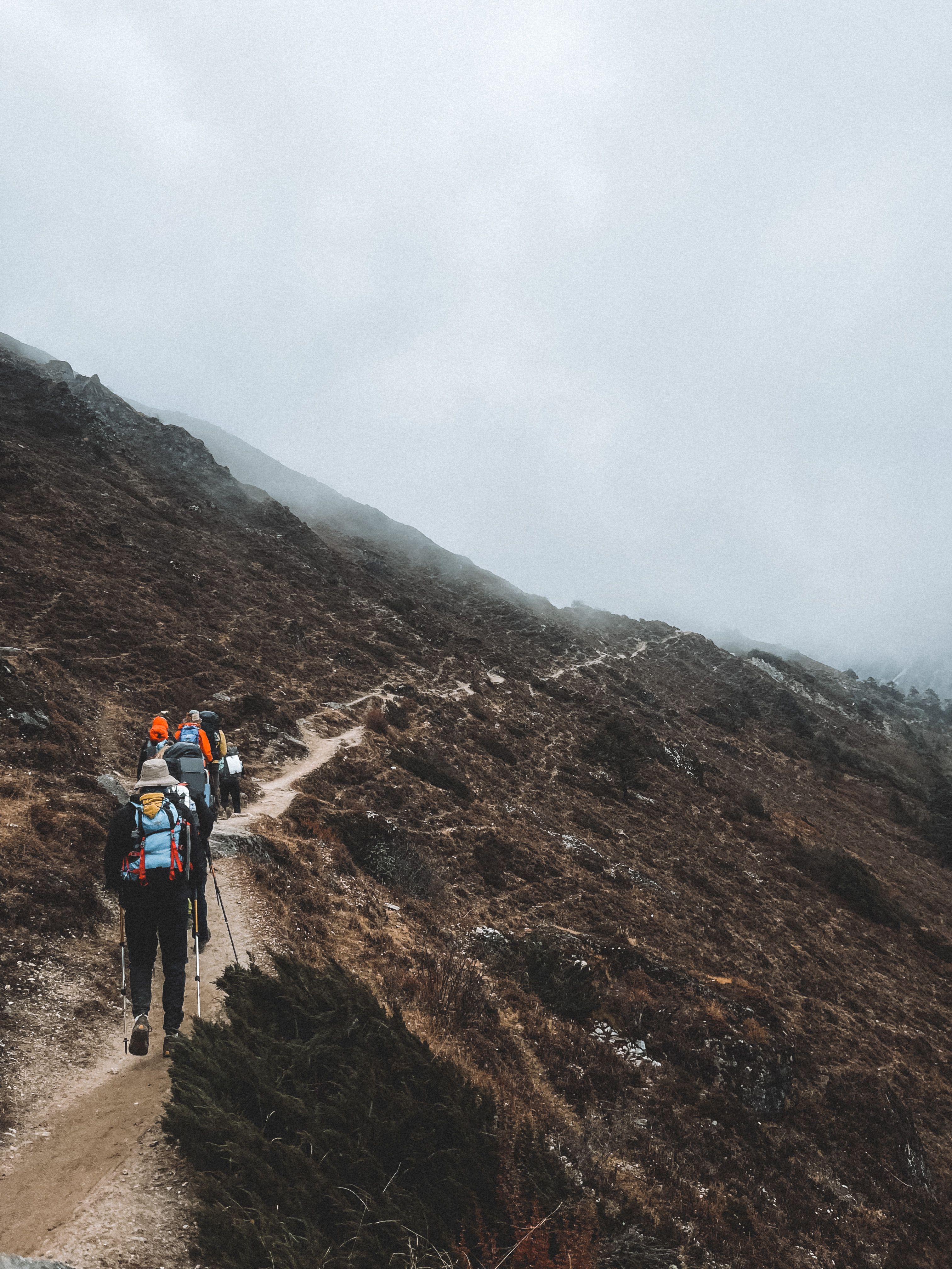 People Hiking on Footpath in Mountains · Free Stock Photo