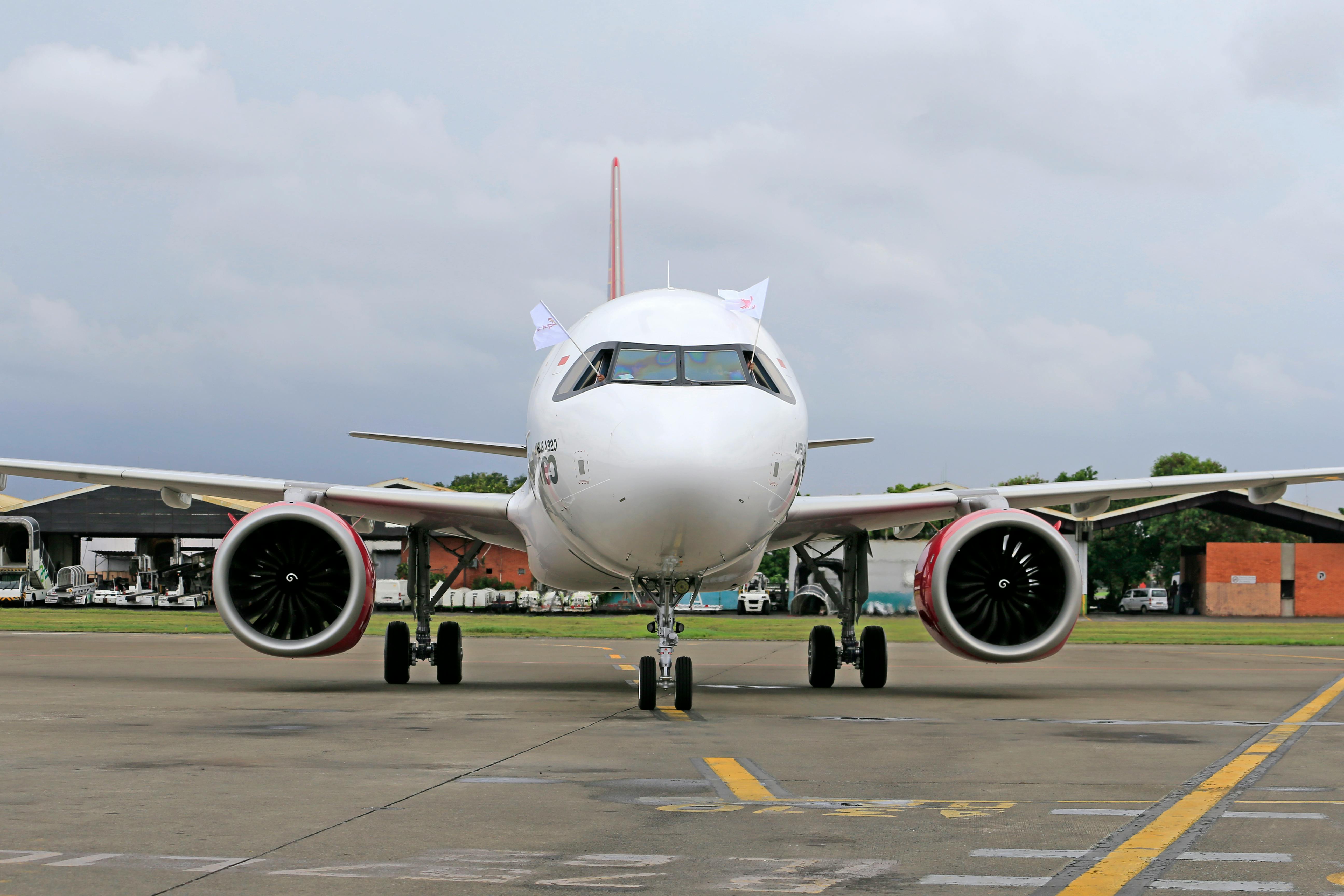 White Airplane on Tarmac · Free Stock Photo