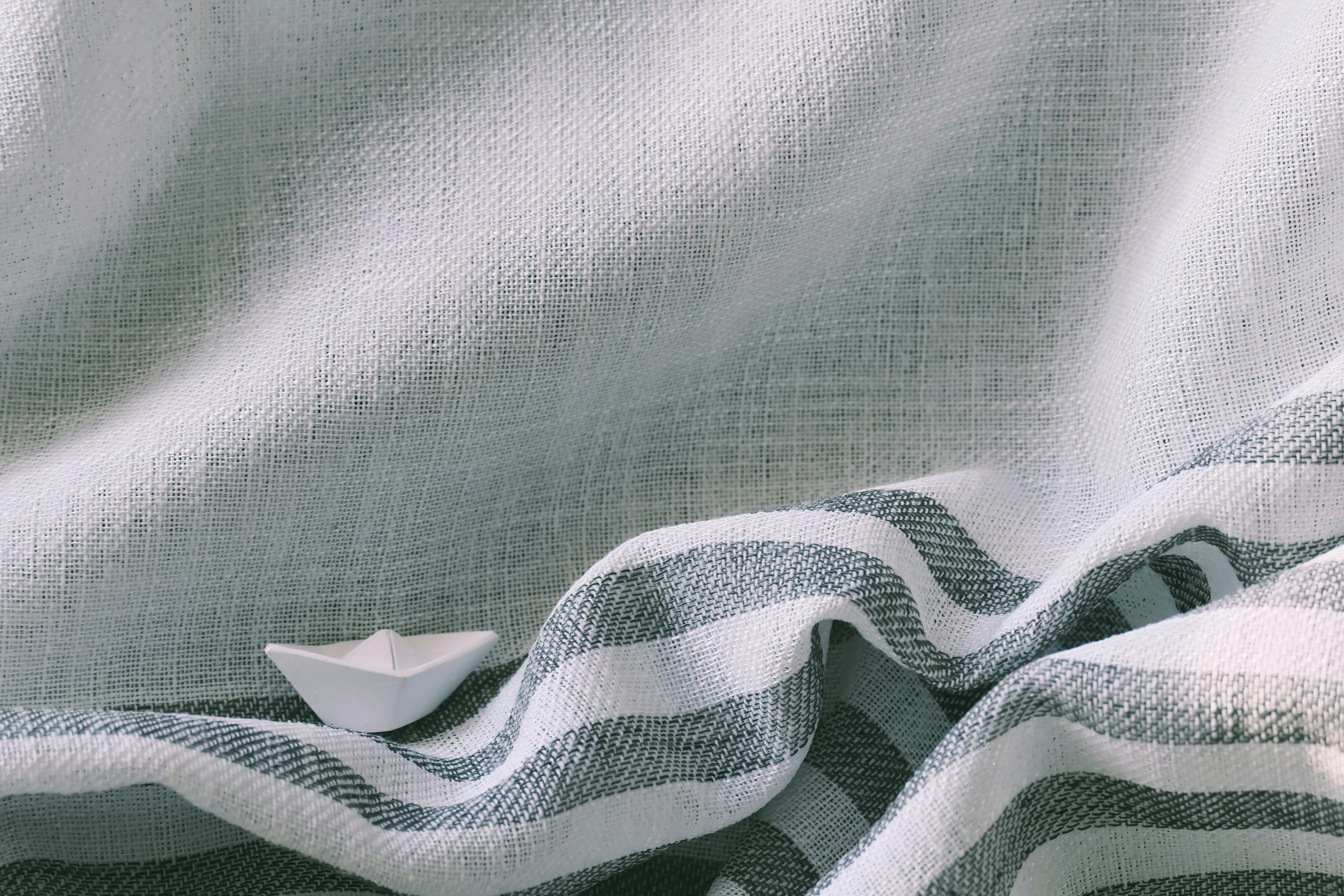 Heap of Clothes and Fabric · Free Stock Photo