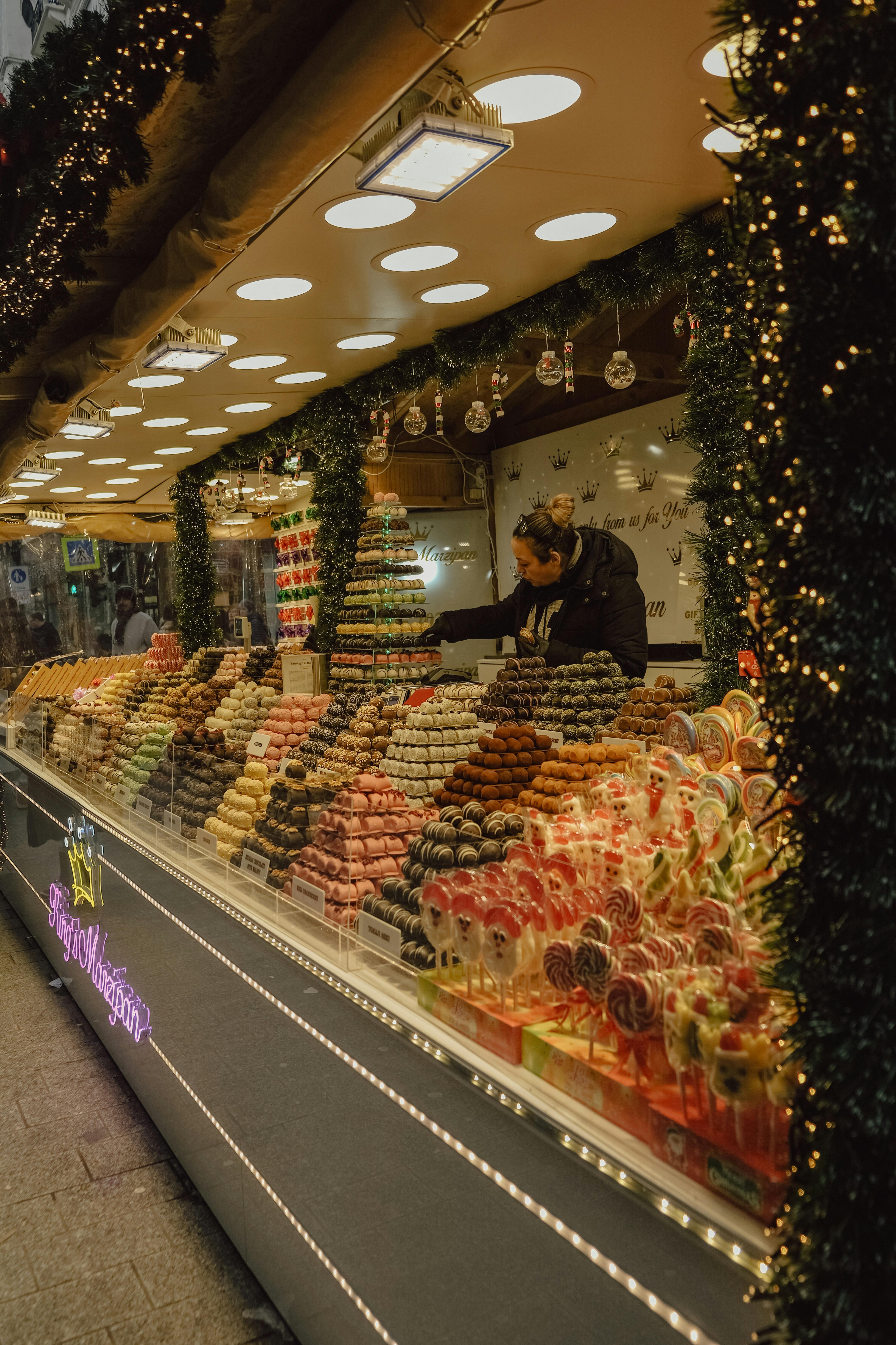Woman in a Candy Shop · Free Stock Photo