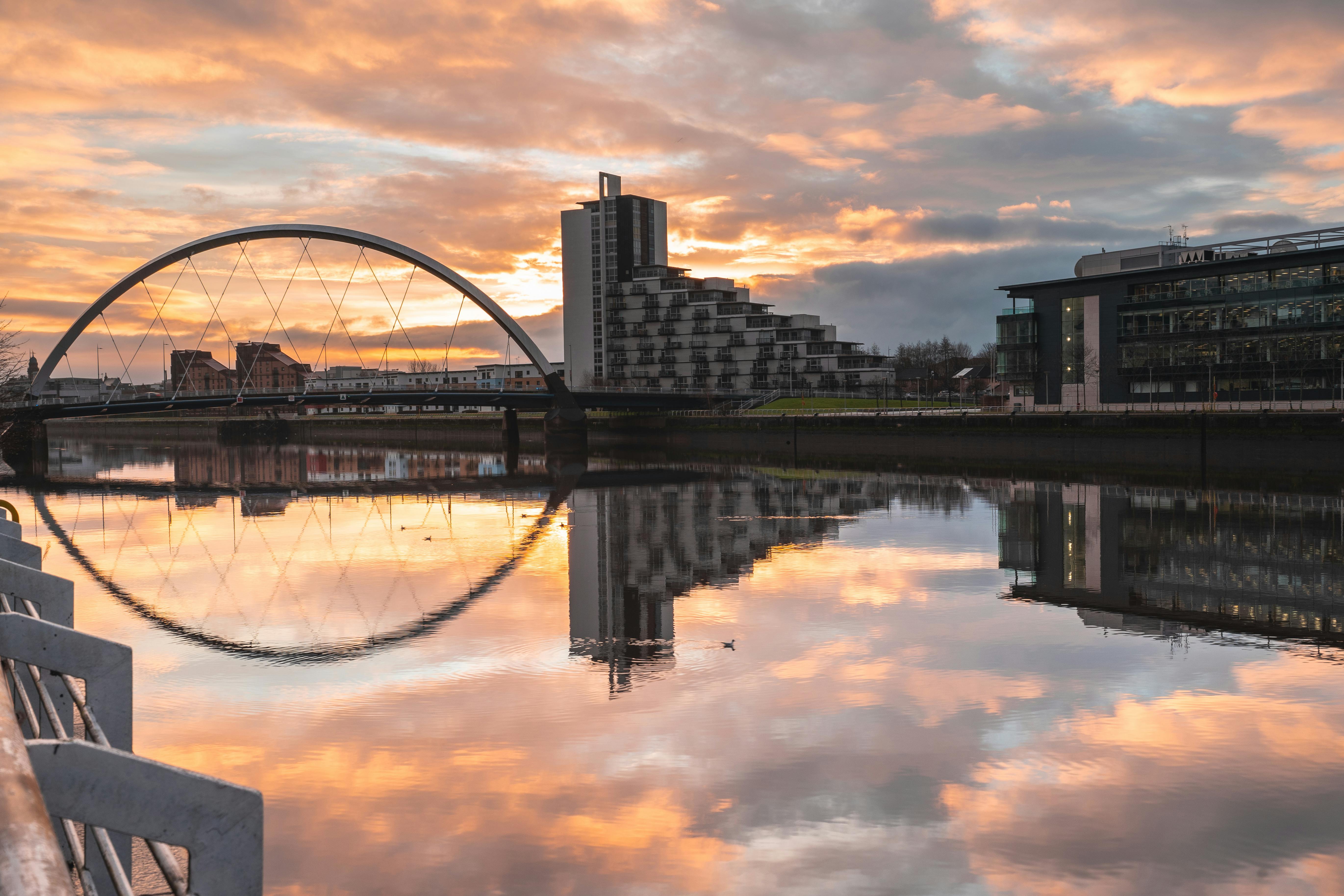 Glasgow with the Clyde Arch Bridge over the Clyde river, Scotland ...