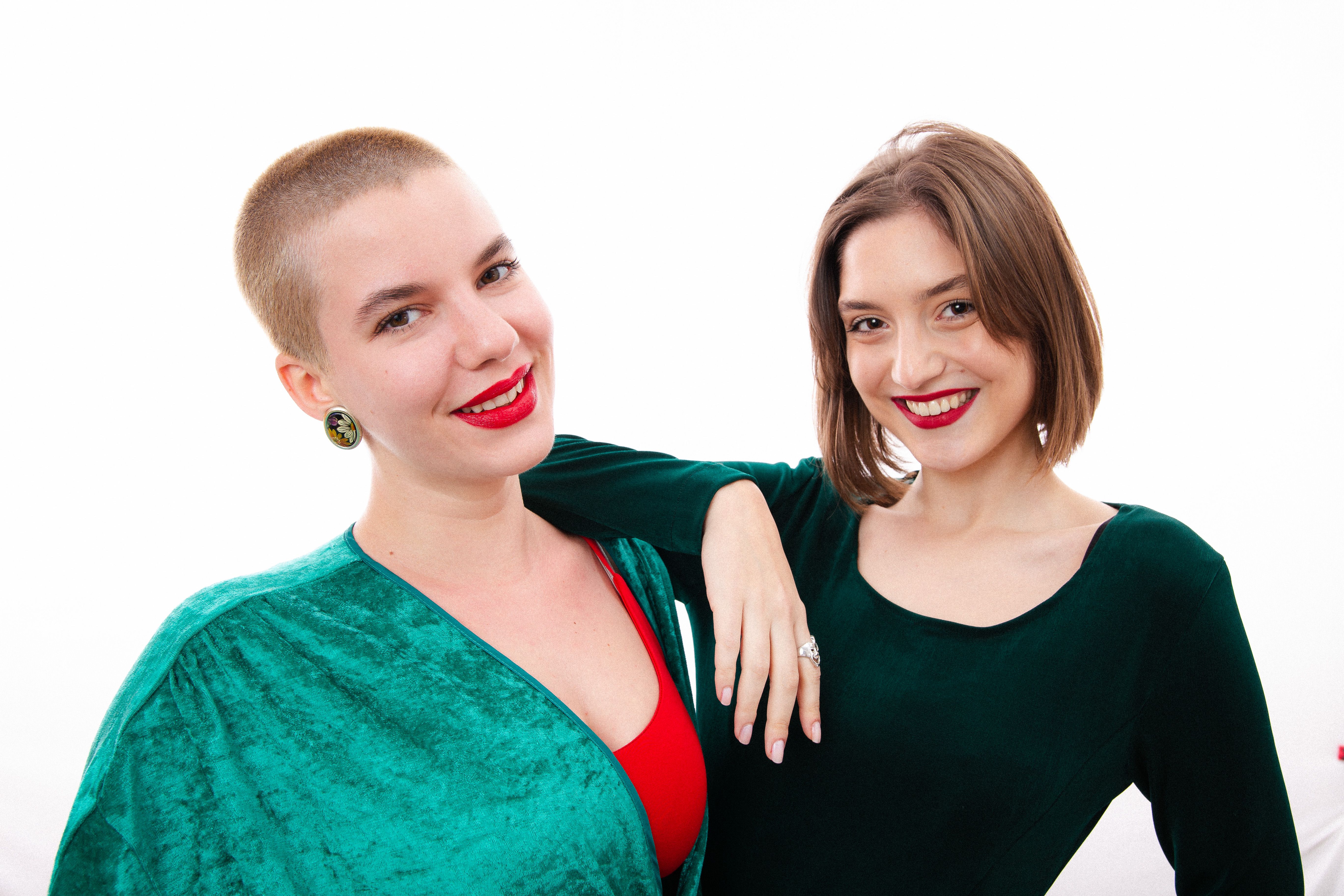 Smiling Women Posing Together · Free Stock Photo
