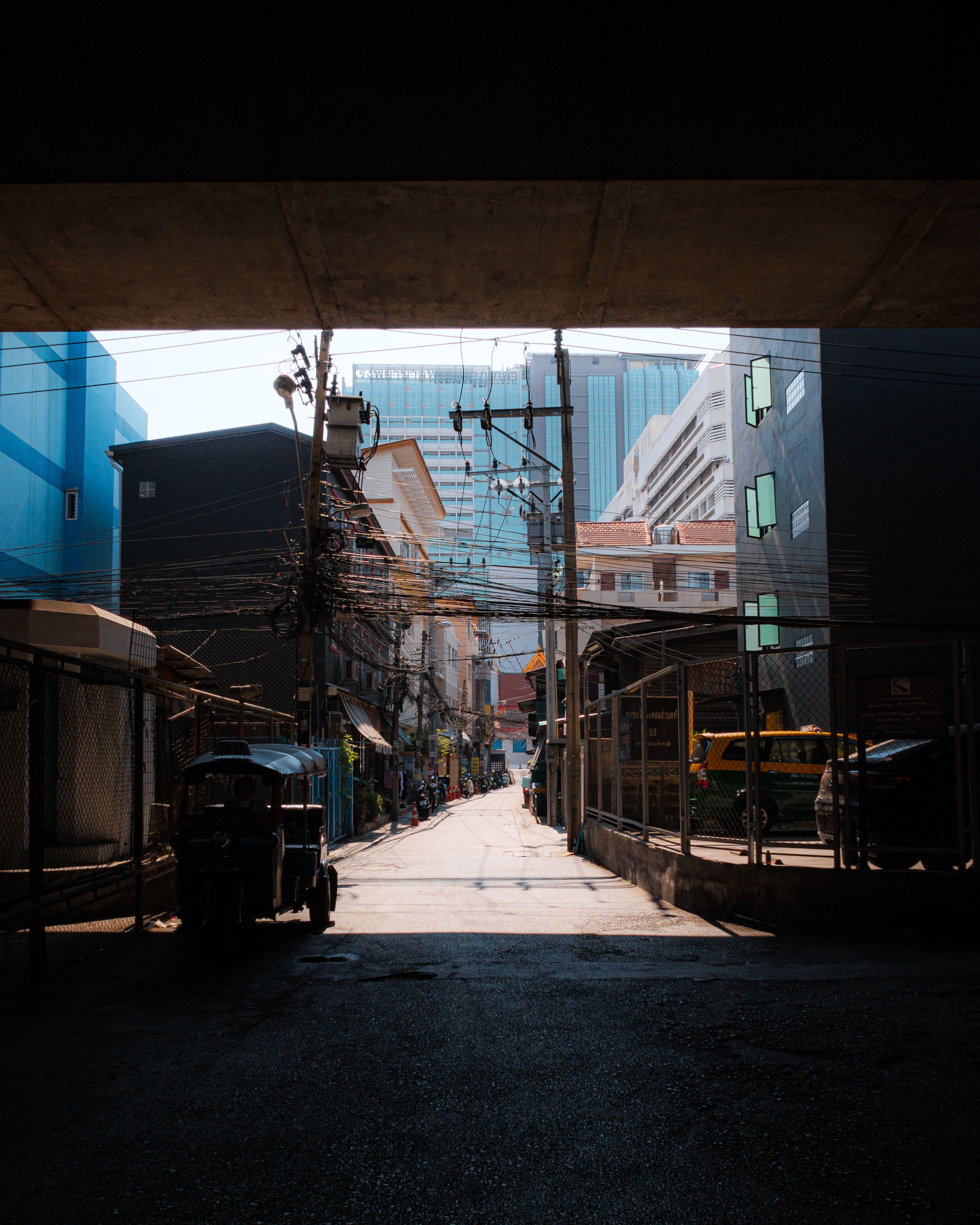 View of a Narrow Alley between Houses in City · Free Stock Photo