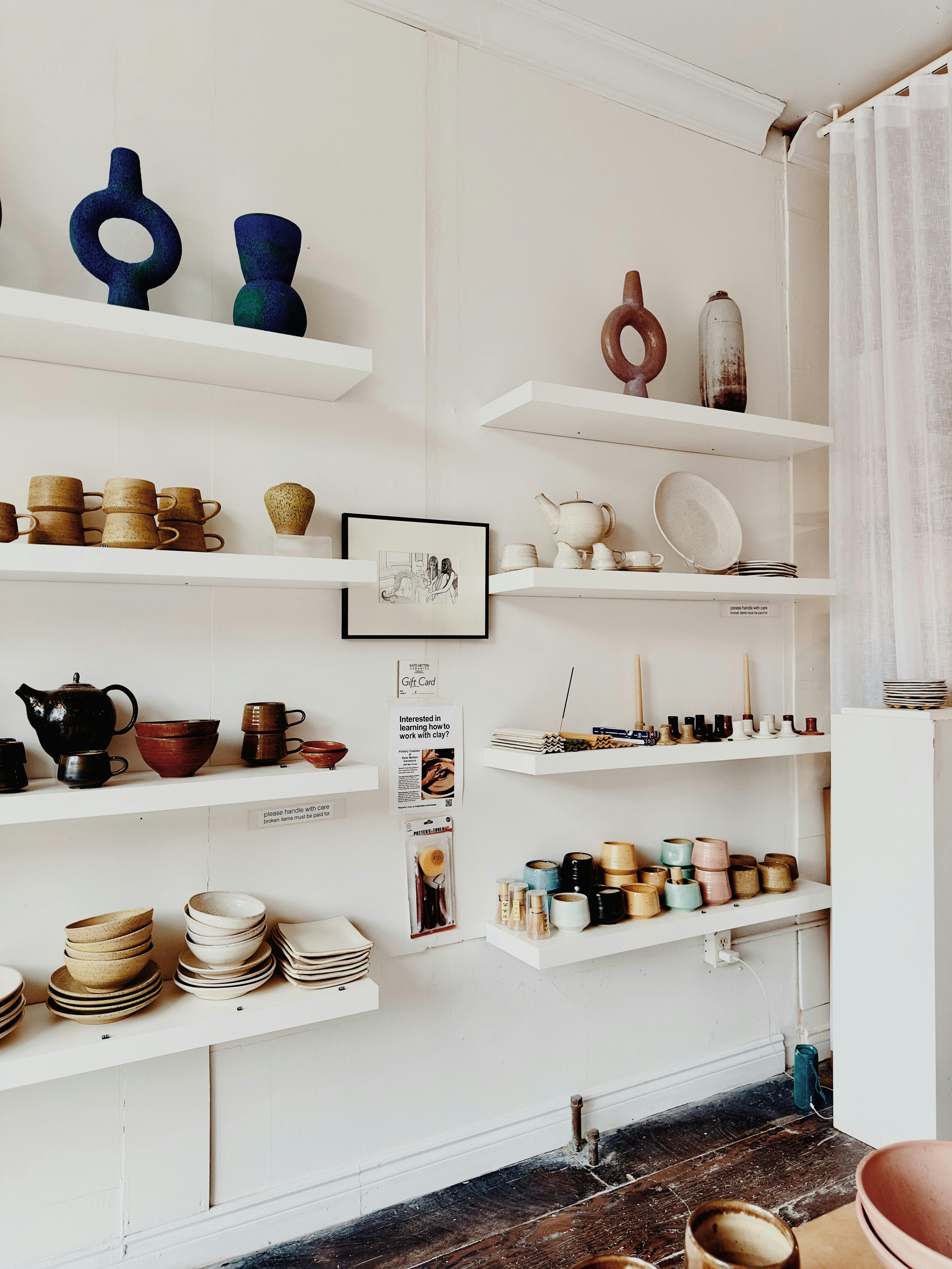 Containers Collection on Wall · Free Stock Photo