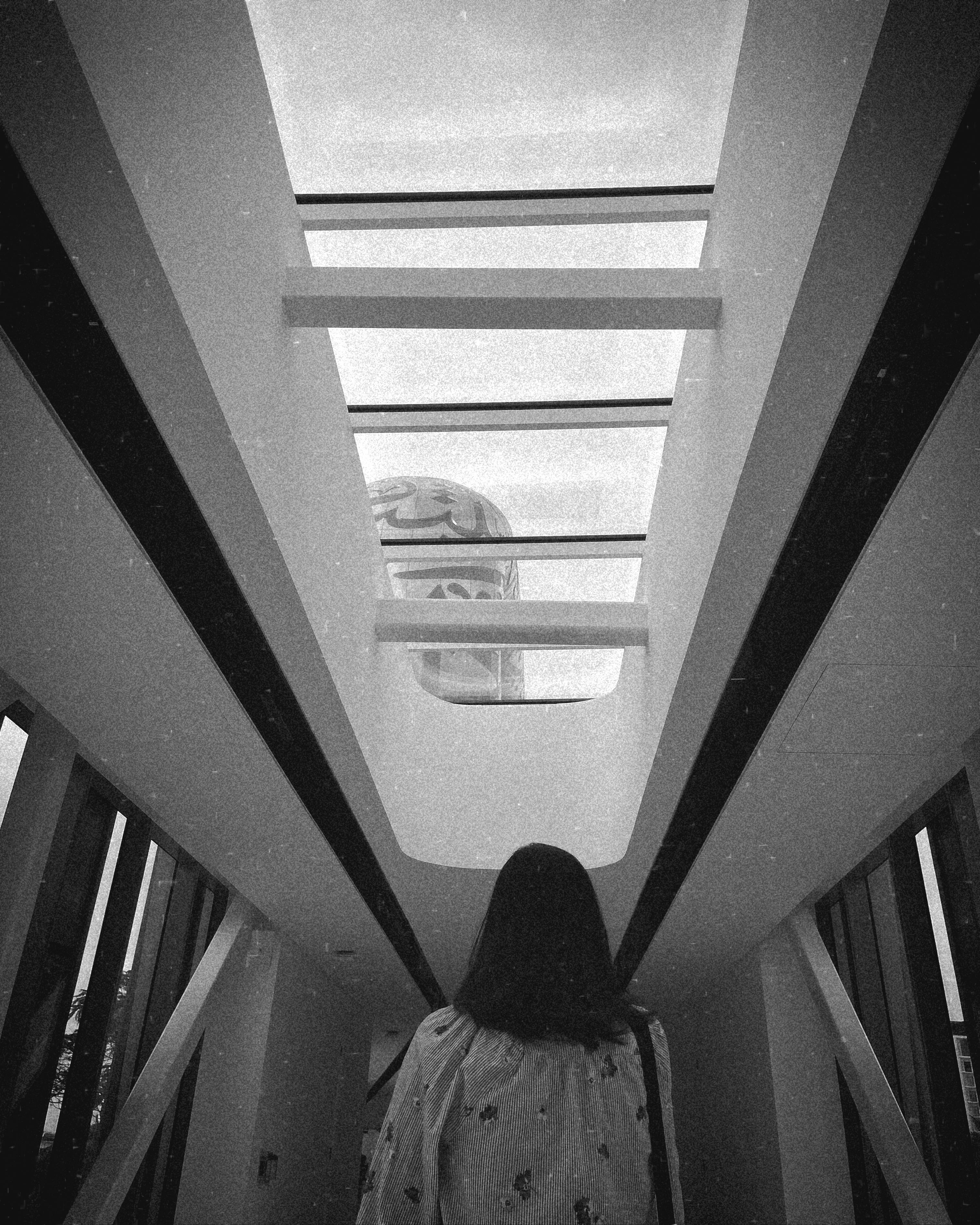 A Woman Standing inside a Building · Free Stock Photo