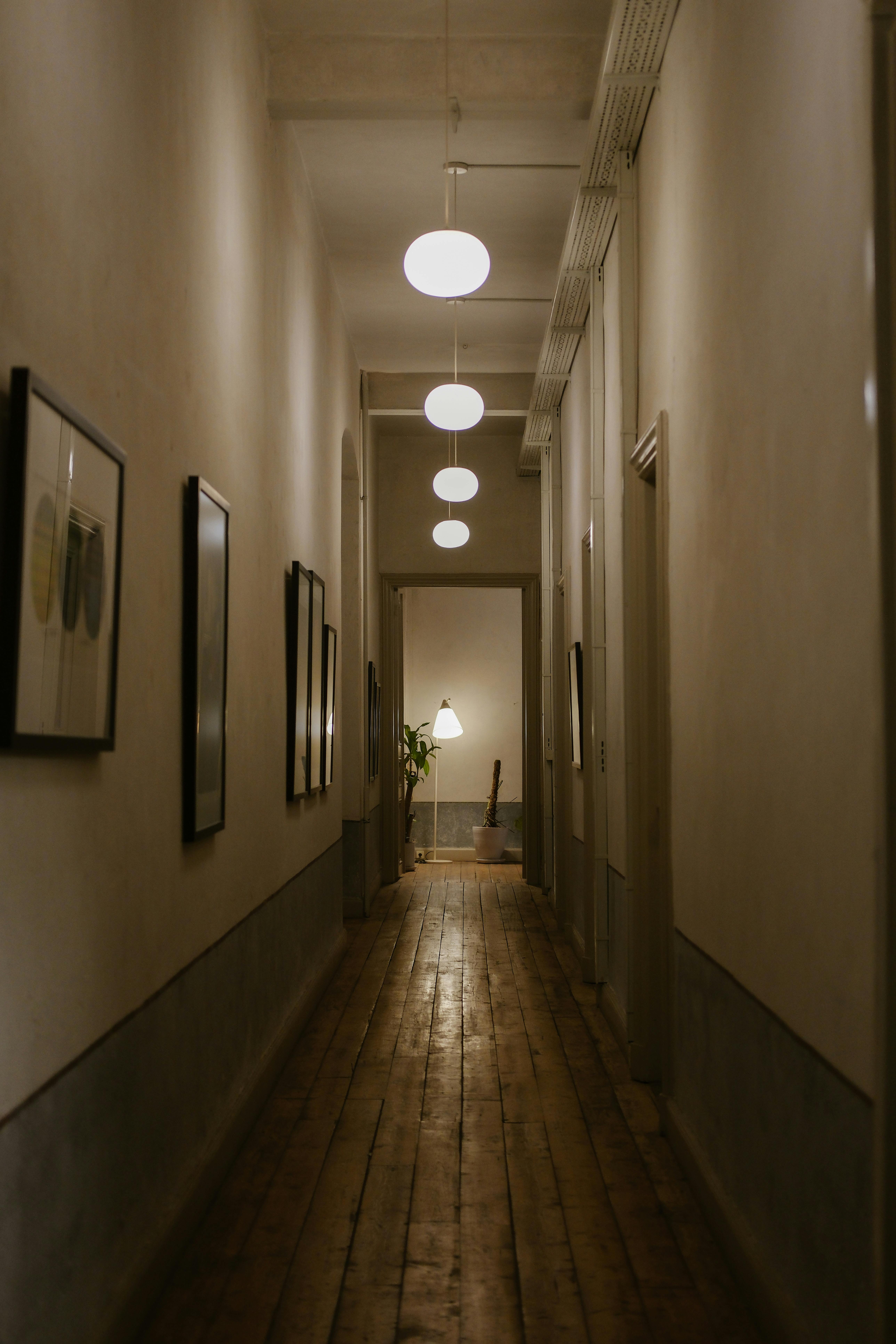 Narrow Corridor with Pictures on the Walls · Free Stock Photo