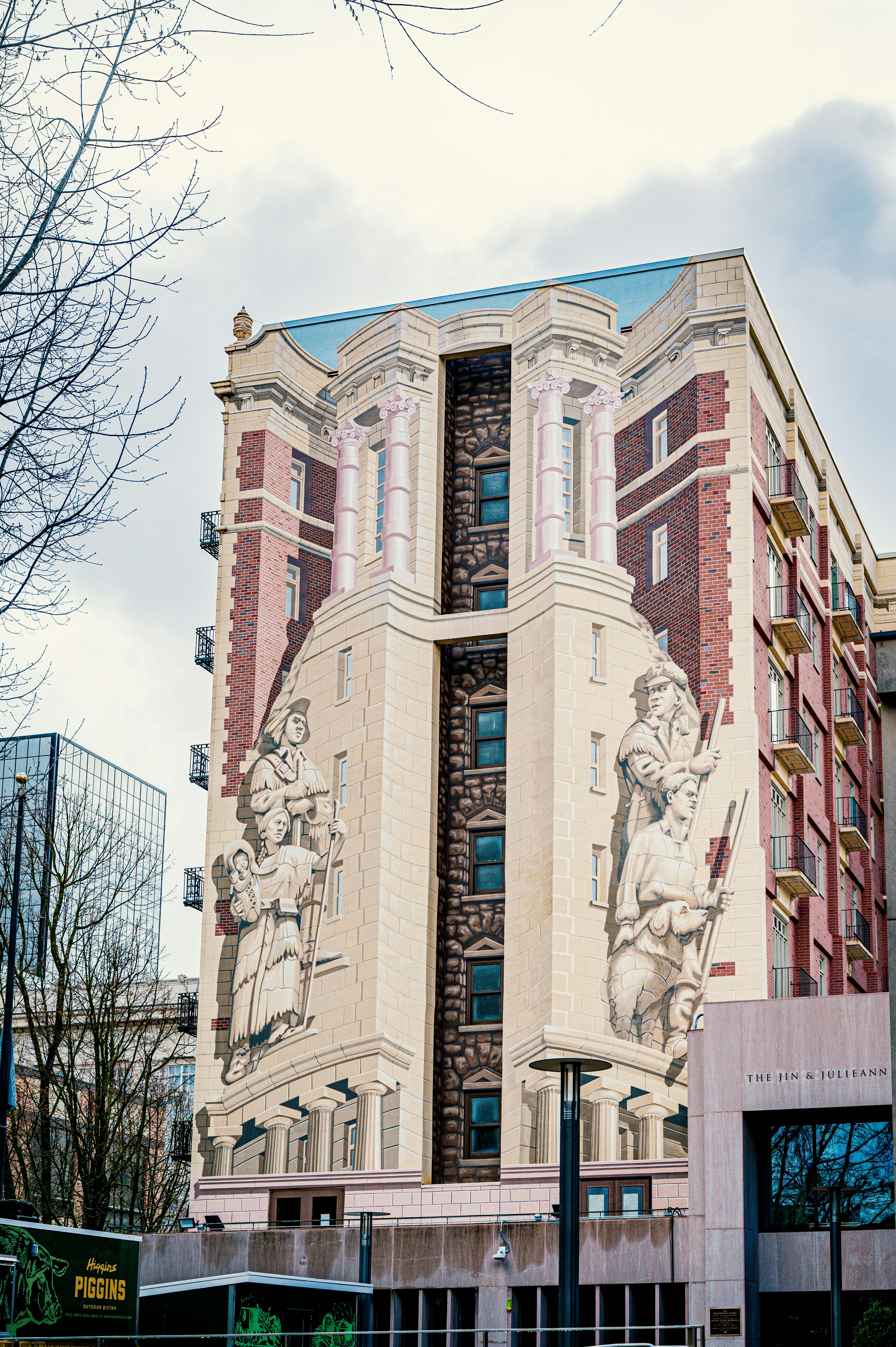 A building with a large mural on it · Free Stock Photo