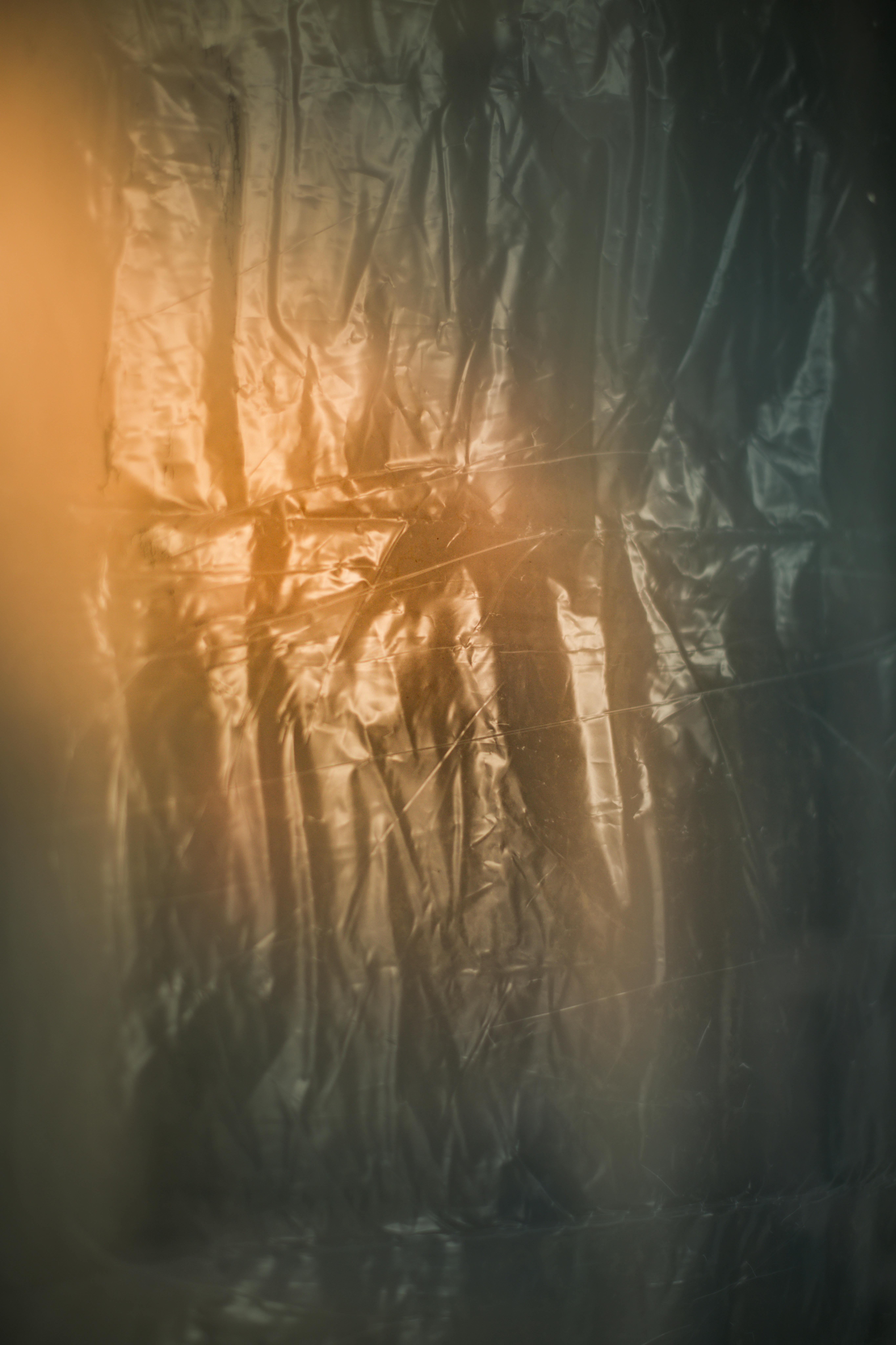 Green Light Shining on Plastic · Free Stock Photo