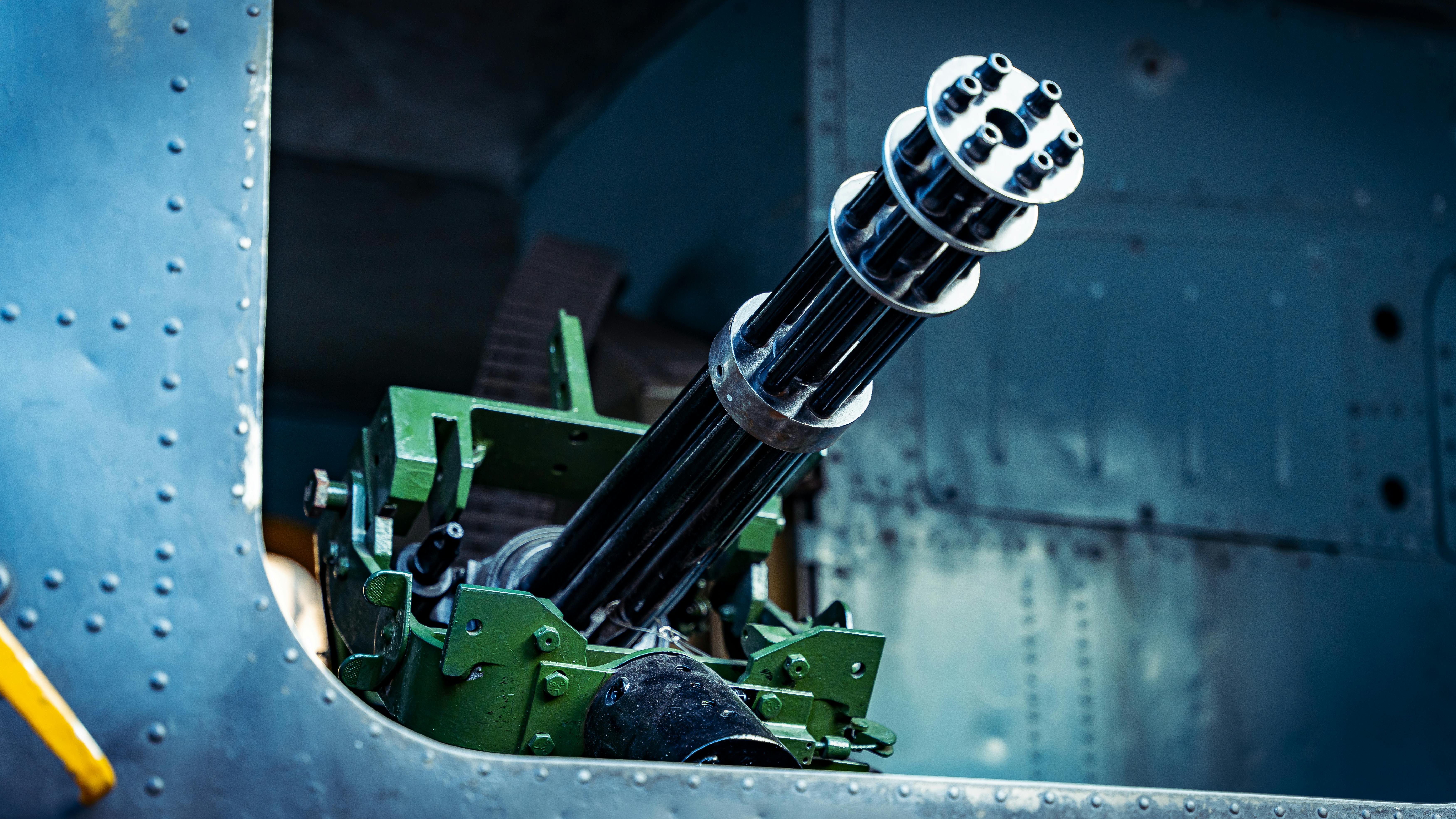 Gatling Gun on Metal Wall · Free Stock Photo