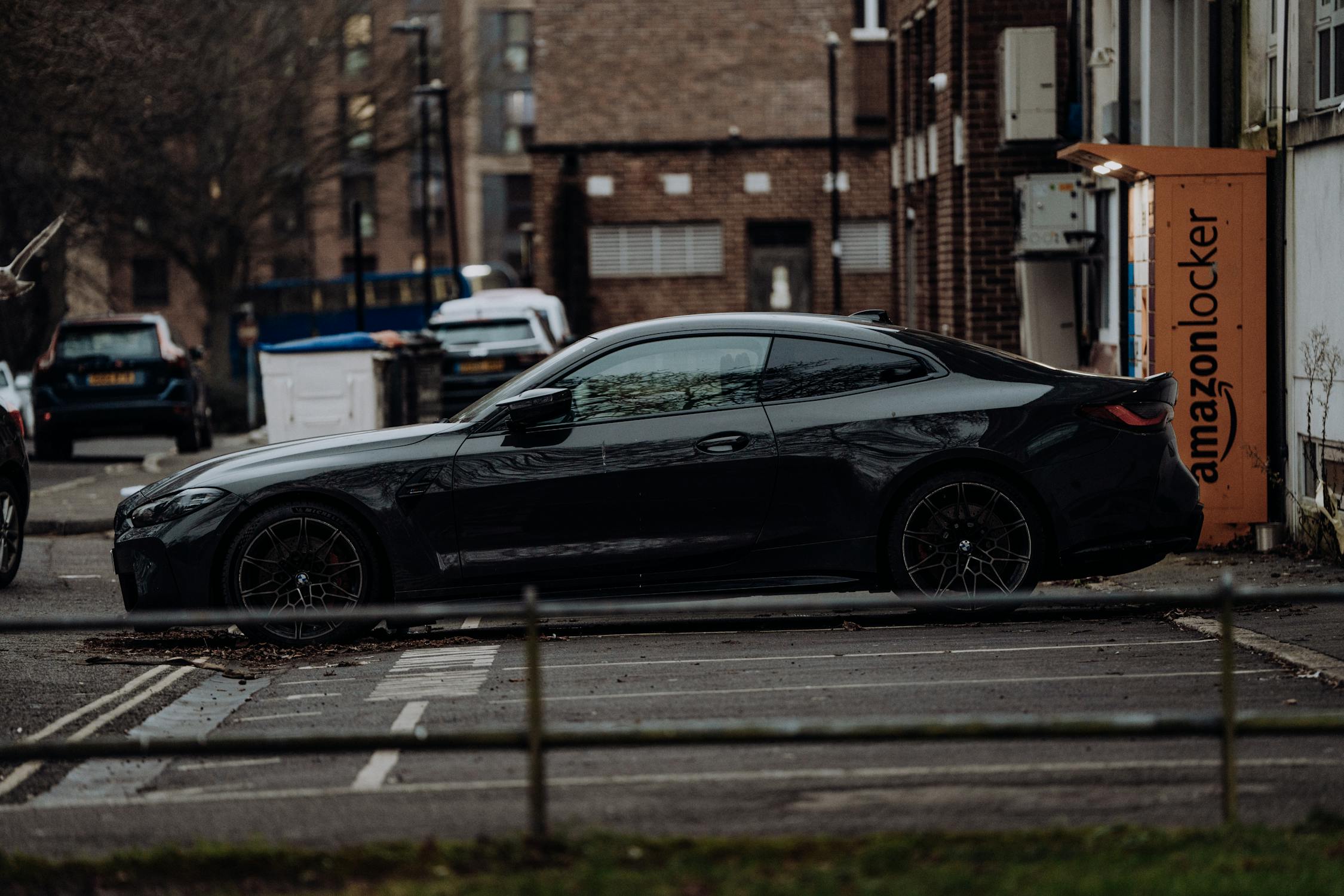 Black Car Coupe on Parking · Free Stock Photo Black Car Coupe on Parking · Free Stock Photo
