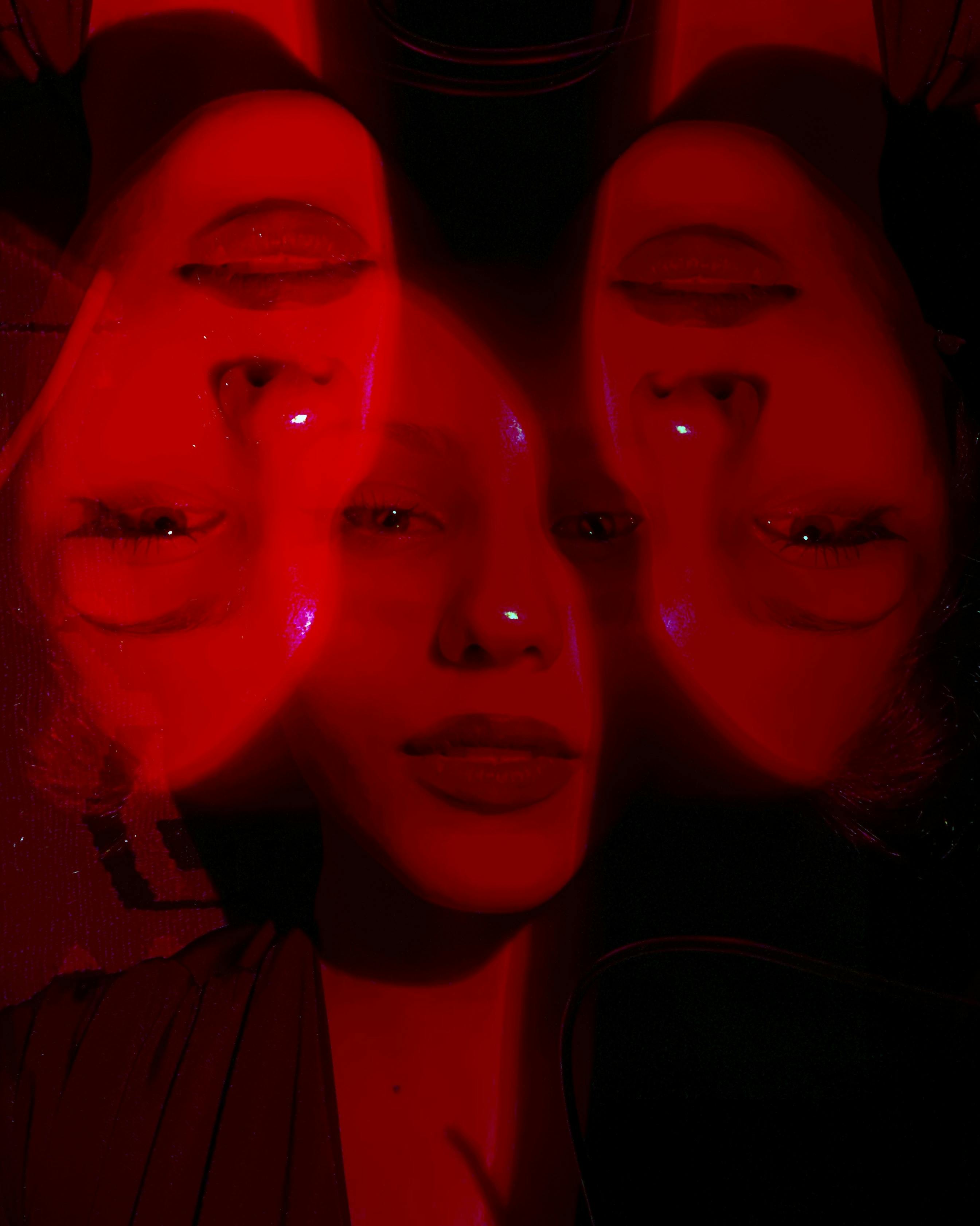 Multiple View of Face in Red Light · Free Stock Photo