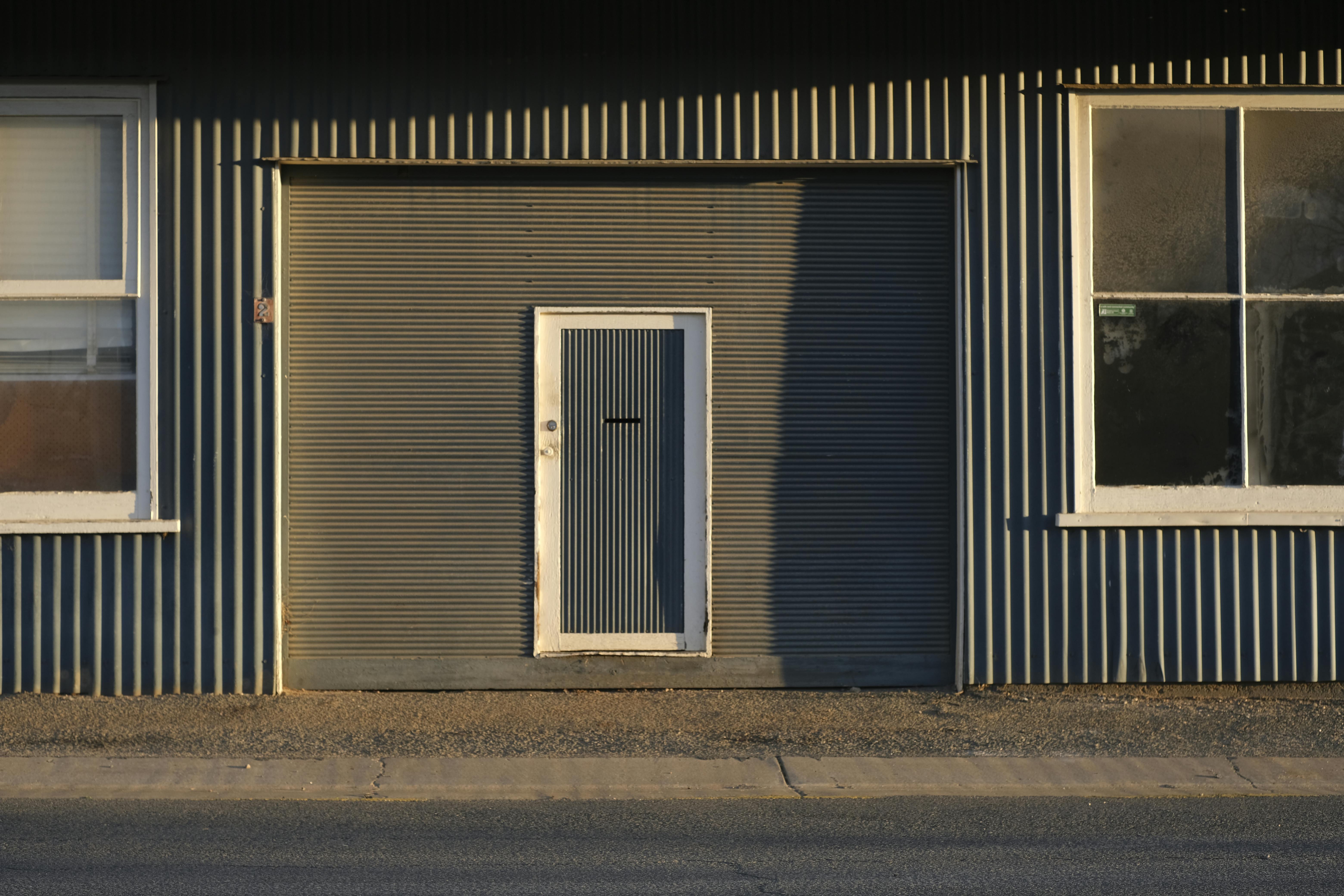 Building Covered with Corrugated Metal · Free Stock Photo