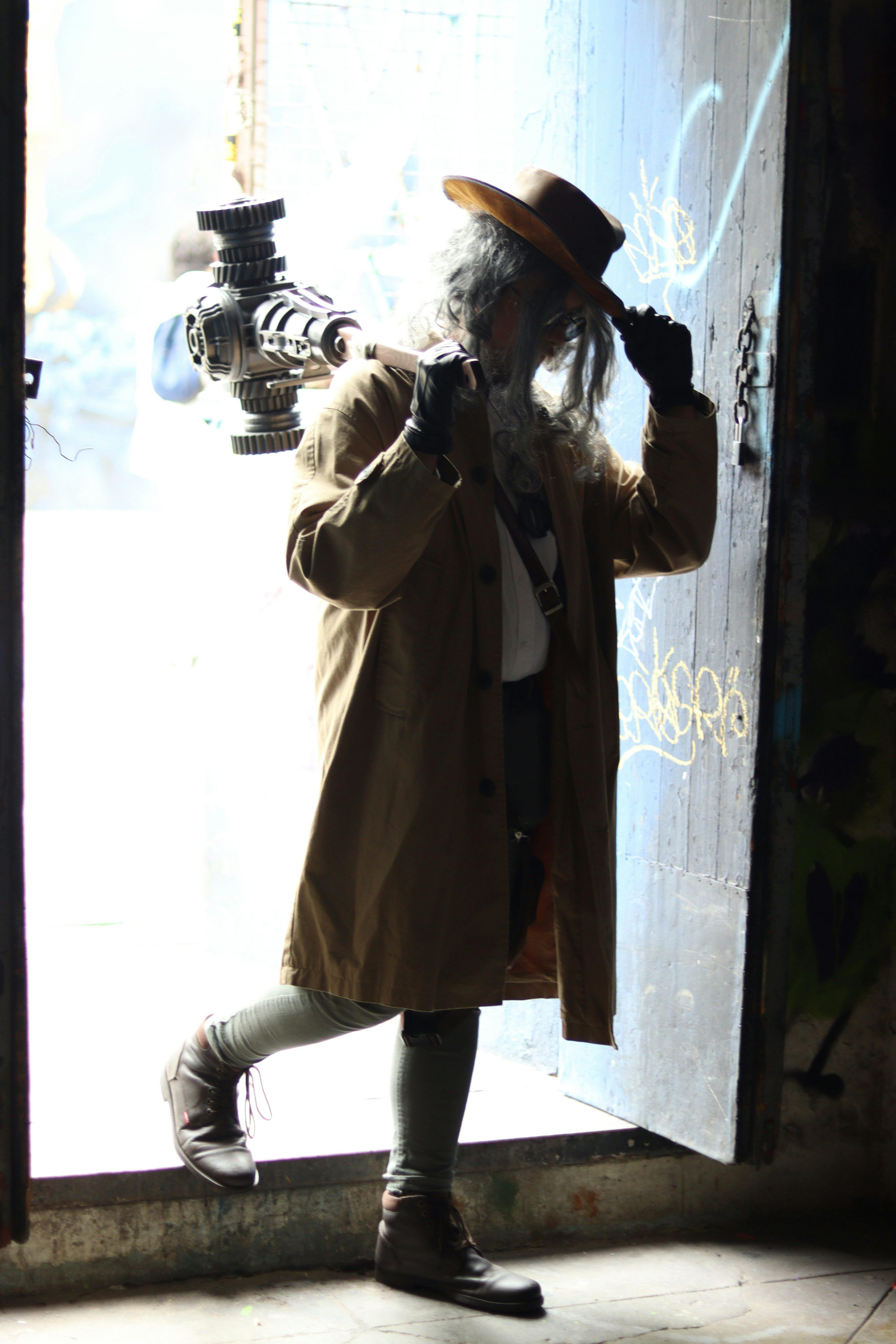 Man Entering Kitchen with Box · Free Stock Photo