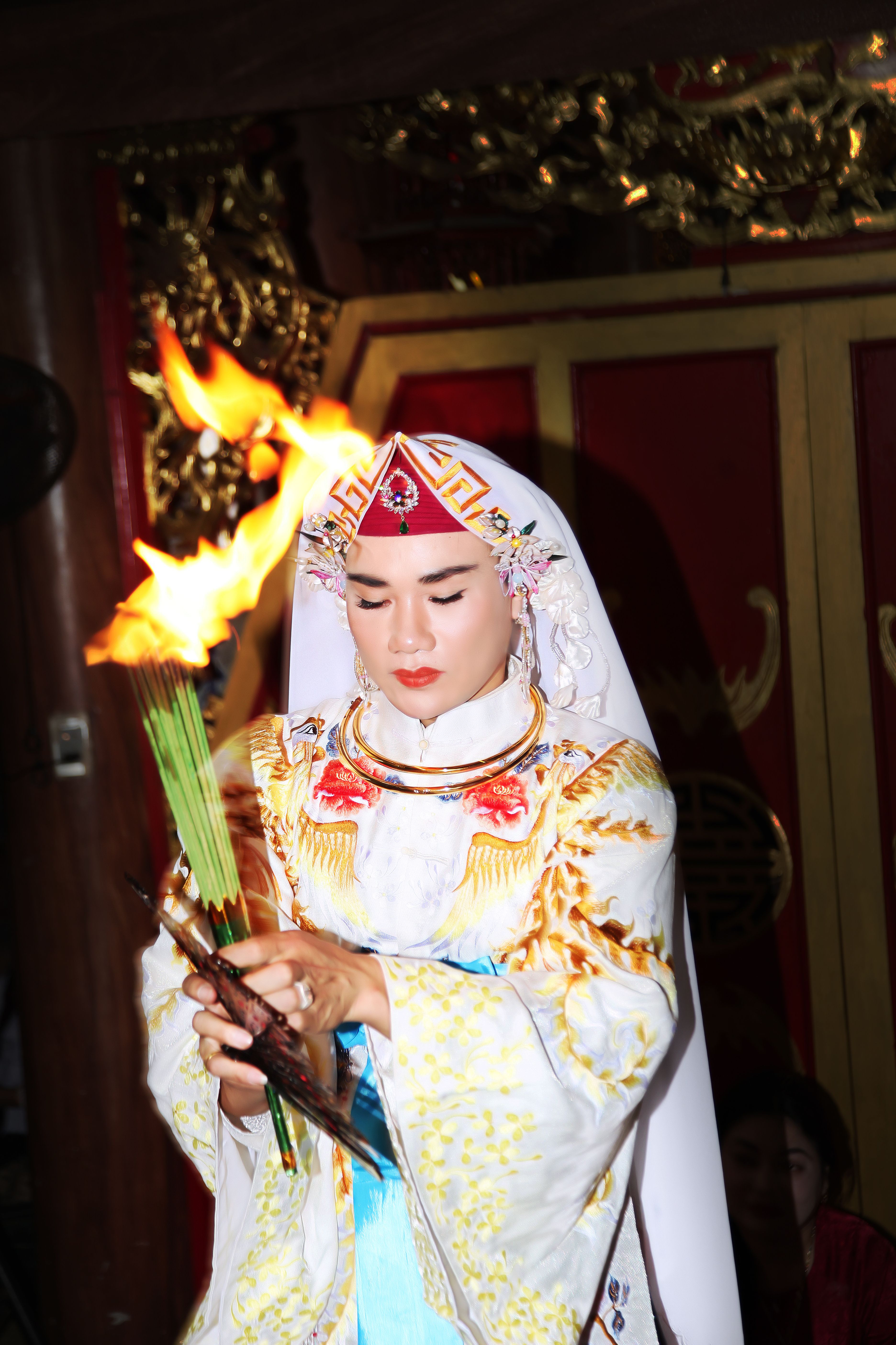 Woman in Traditional Clothing Holding Burning Incense in Ritual · Free ...