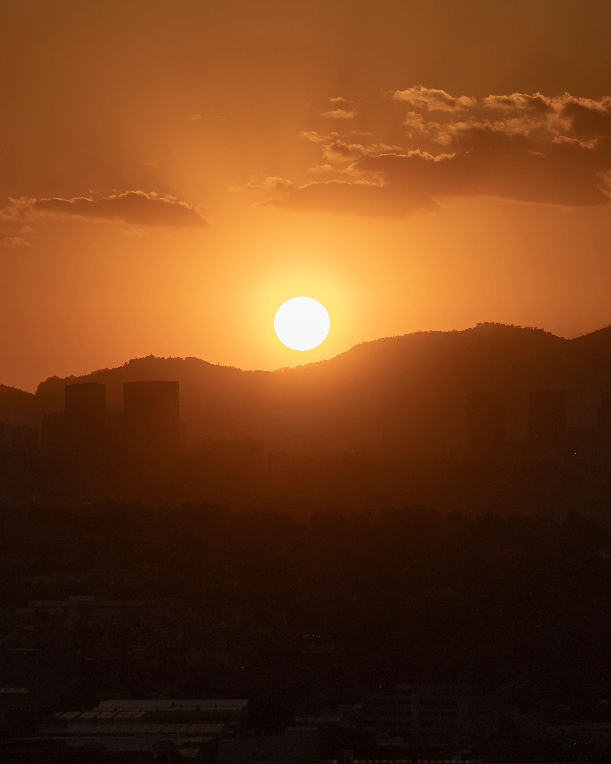 City Silhouette under Hill at Sunset · Free Stock Photo
