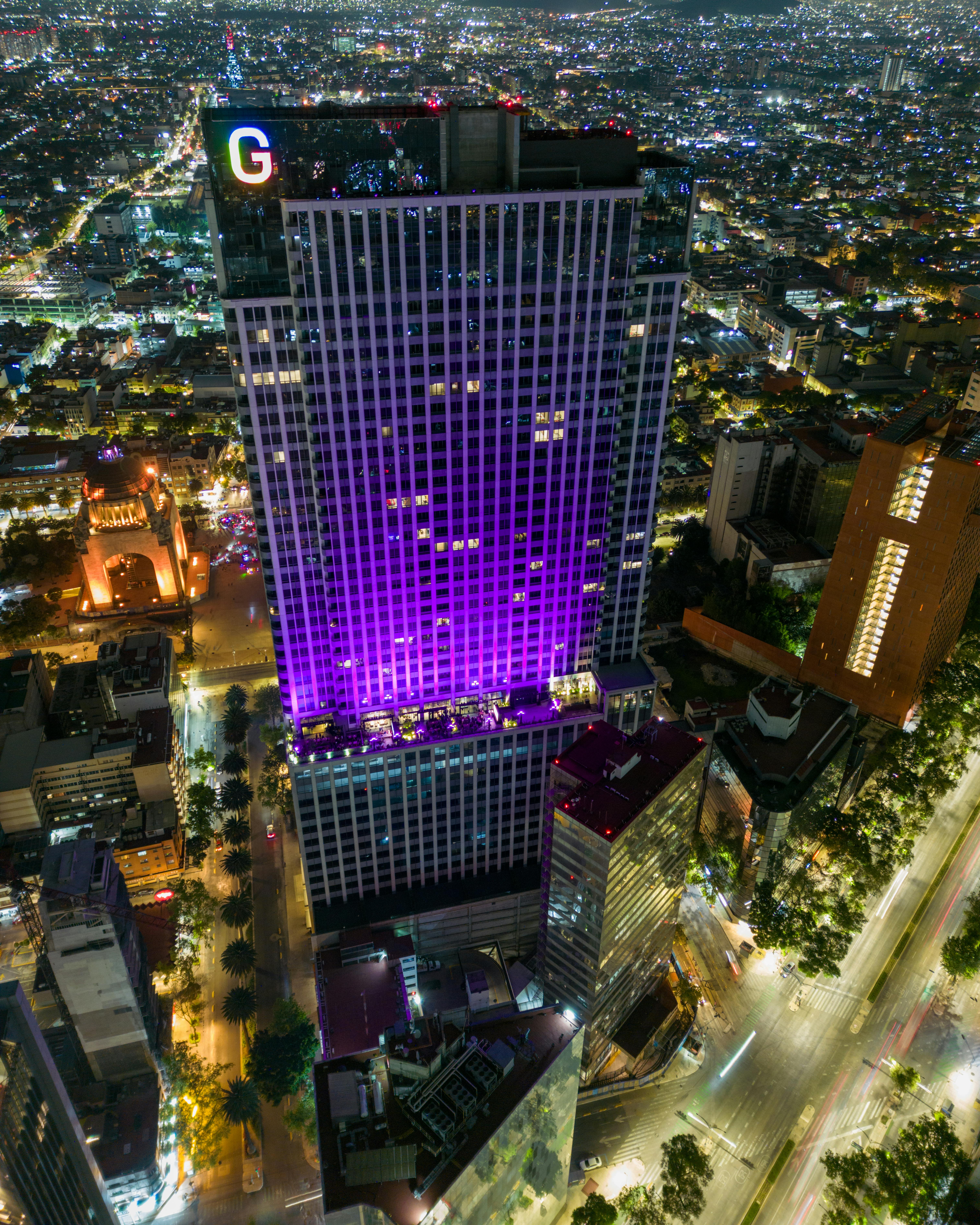 Illuminated Skyscraper in Mexico City at Night · Free Stock Photo