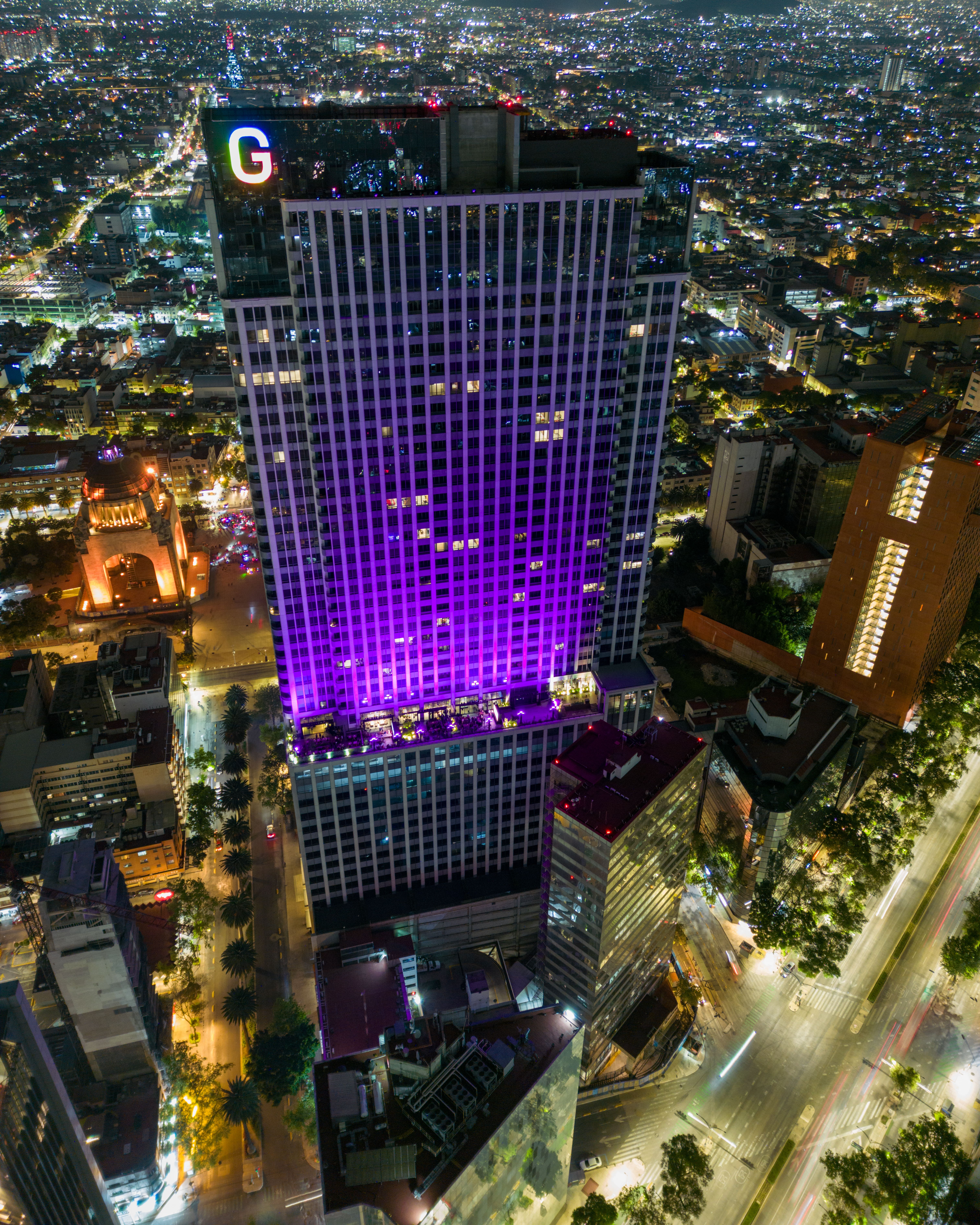 Illuminated Skyscraper in Mexico City at Night · Free Stock Photo
