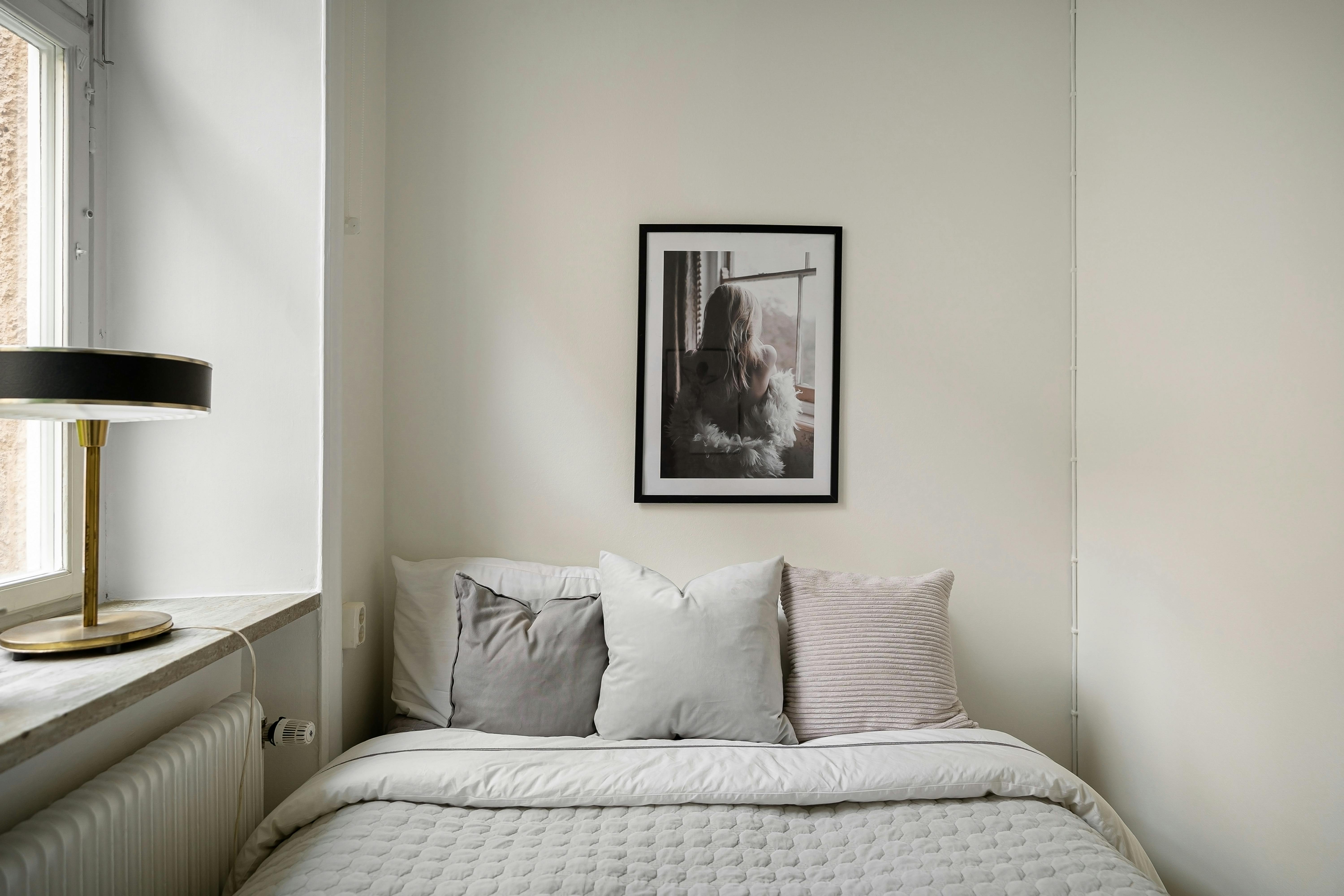 Woman Picture over Bed · Free Stock Photo