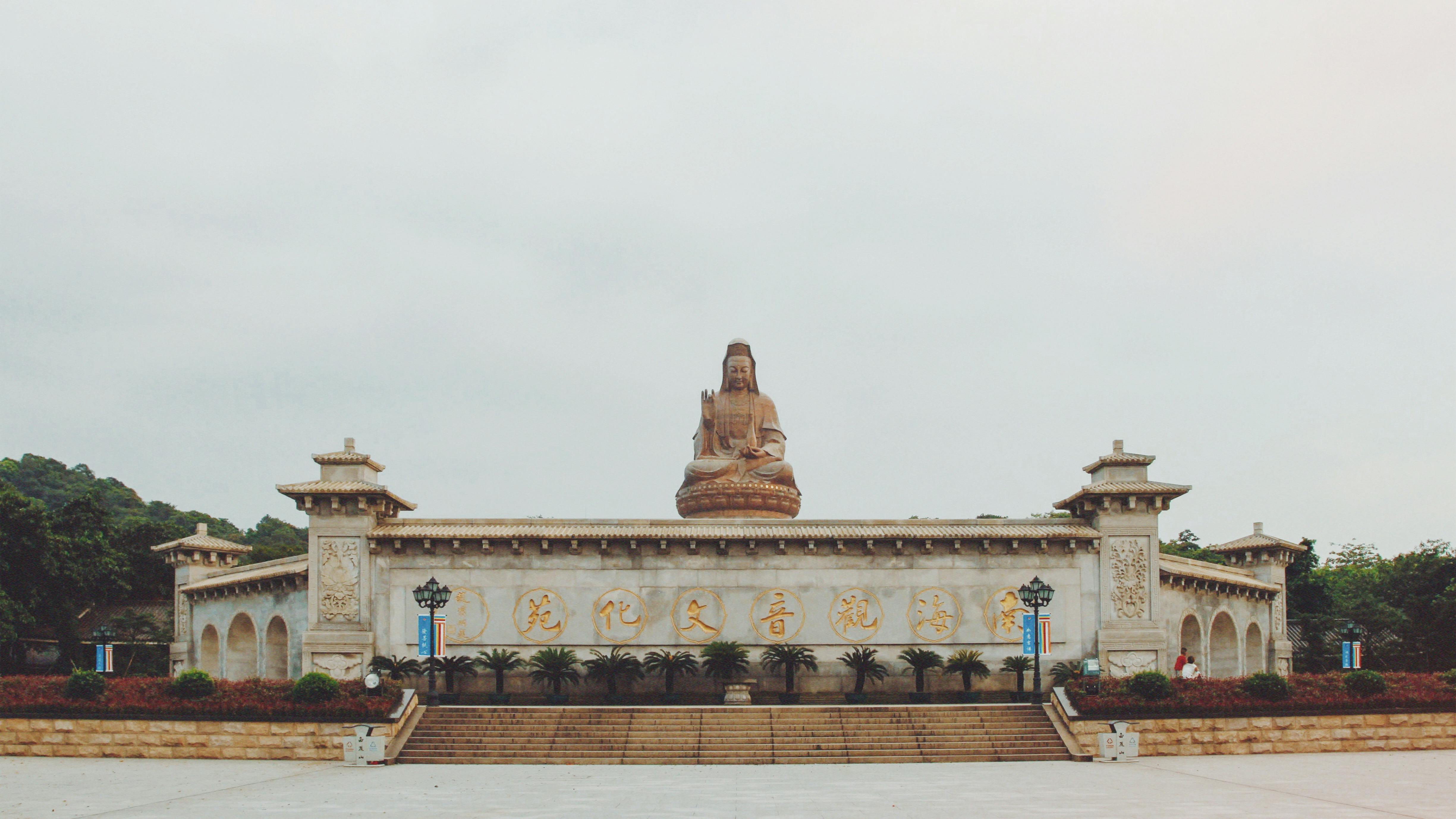 Facade of a Temple and Guanyin of Mount Xiqiao in the Background · Free ...